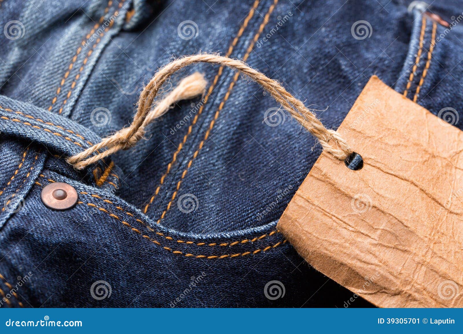 Jeans label on string stock image. Image of manufacturing - 39305701
