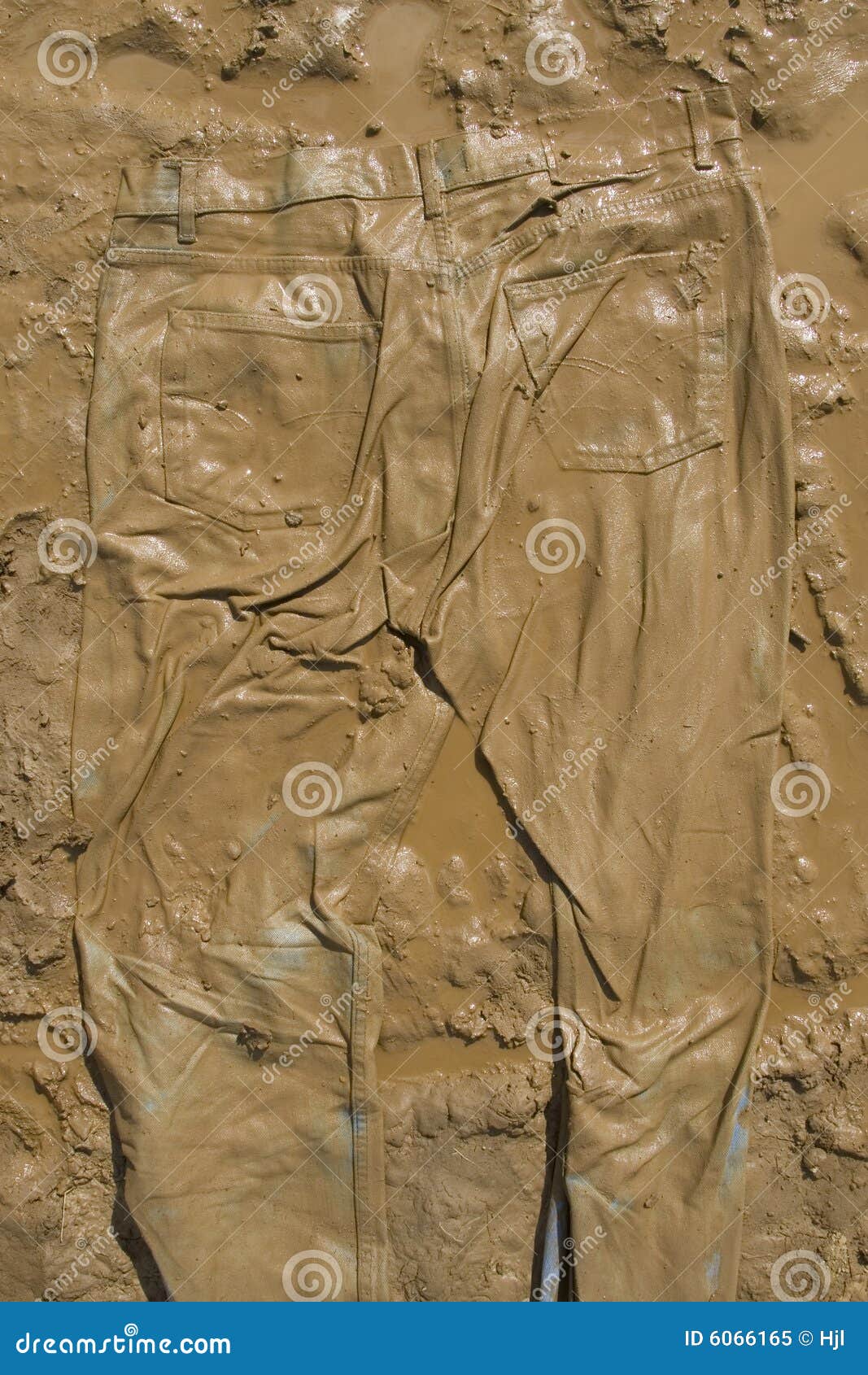 Jeans on mud stock image. Image of grime, style, detail - 6066165