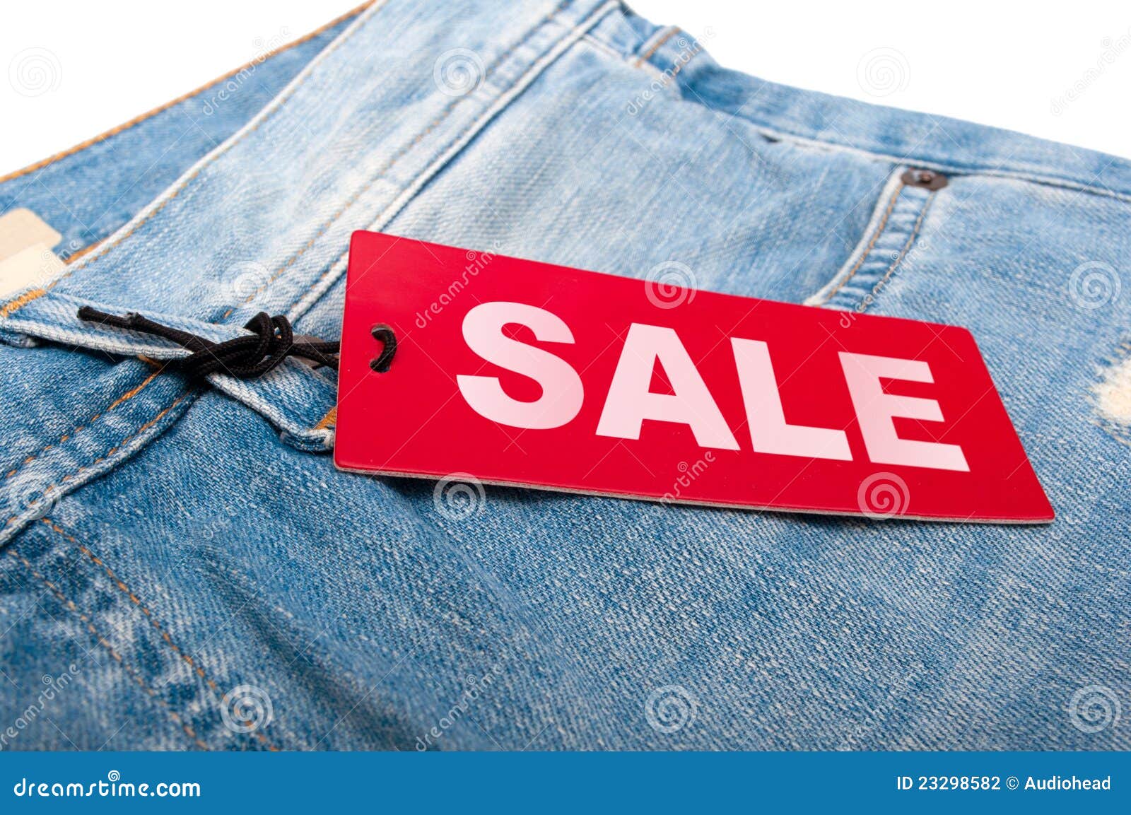 Jeans with Sale Tag stock photo. Image of paper, attached - 23298582