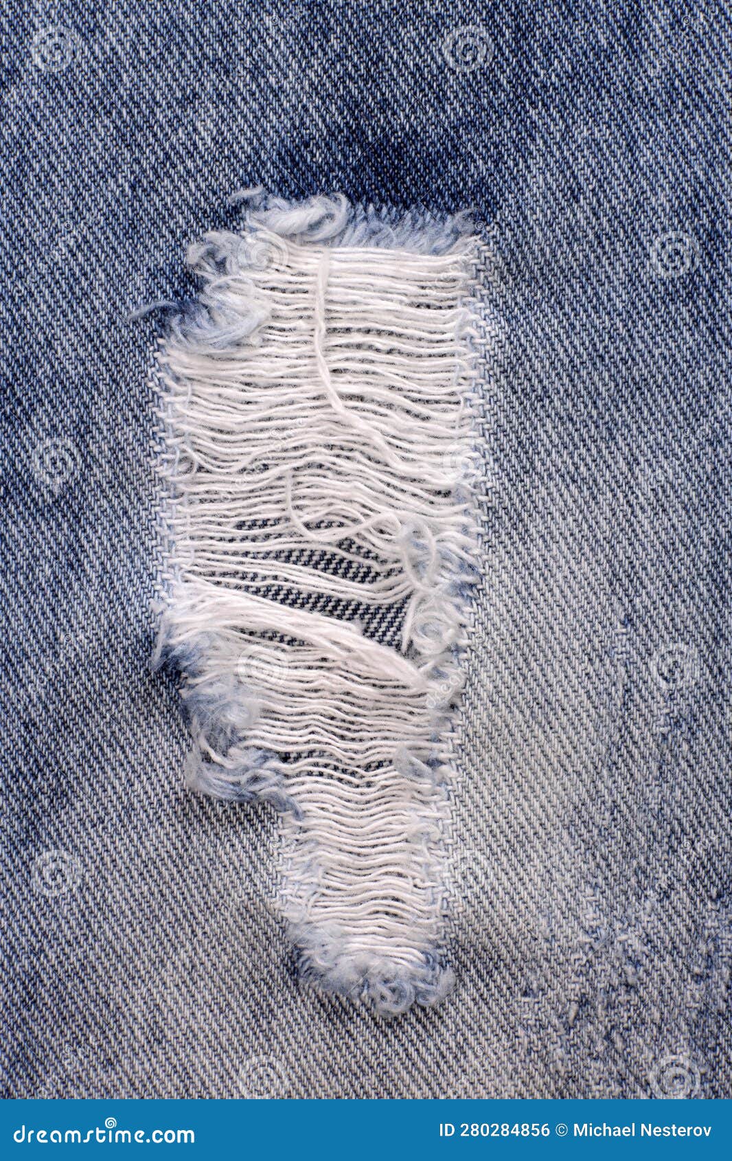 Jeans Torn, Hole Denim Texture. Vertical Orientation Stock Photo ...