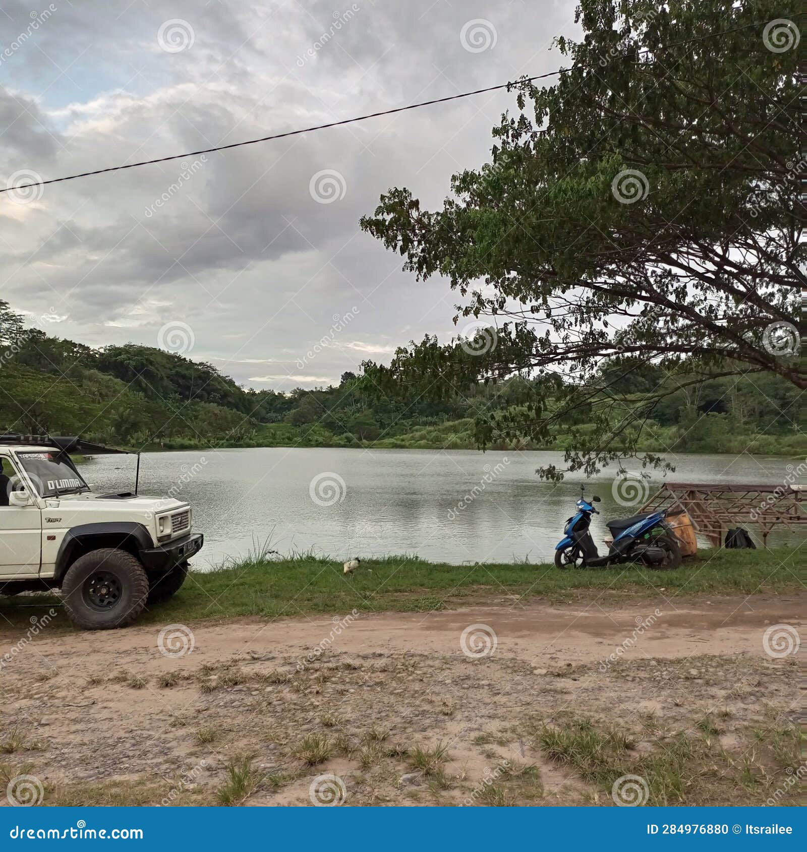 Jeep with the Lake and the Beautiful Scenery Stock Photo - Image of ...