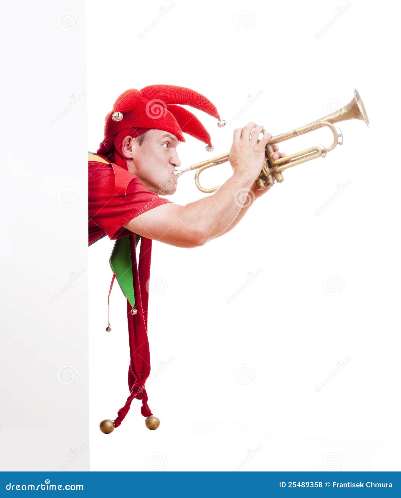 Jester blowing trumpet stock photo. Image of comedian - 25489358