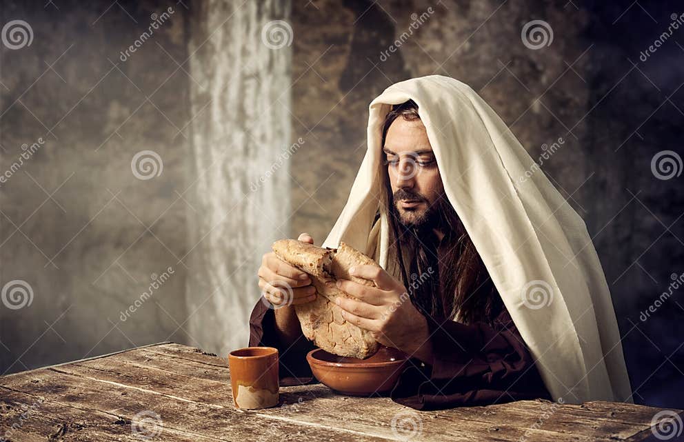 Jesus breaks the bread stock photo. Image of divide, christian - 39081100