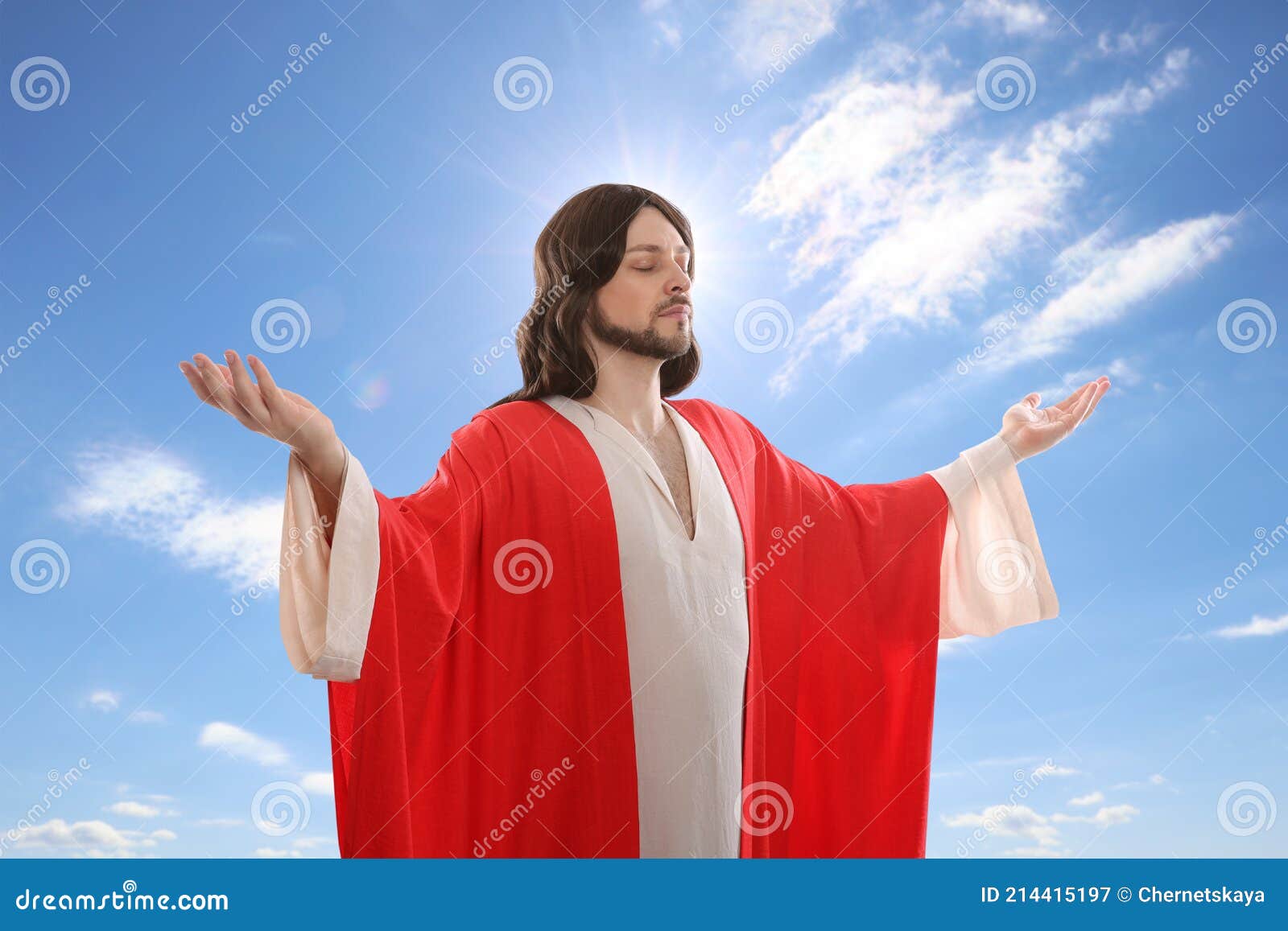 Jesus Christ with Outstretched Arms Against Blue Sky Stock Image ...
