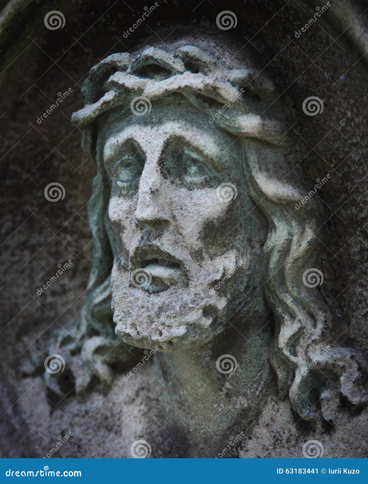 Jesus Christ Statue Against a Background of Gray Stone Stock Image ...