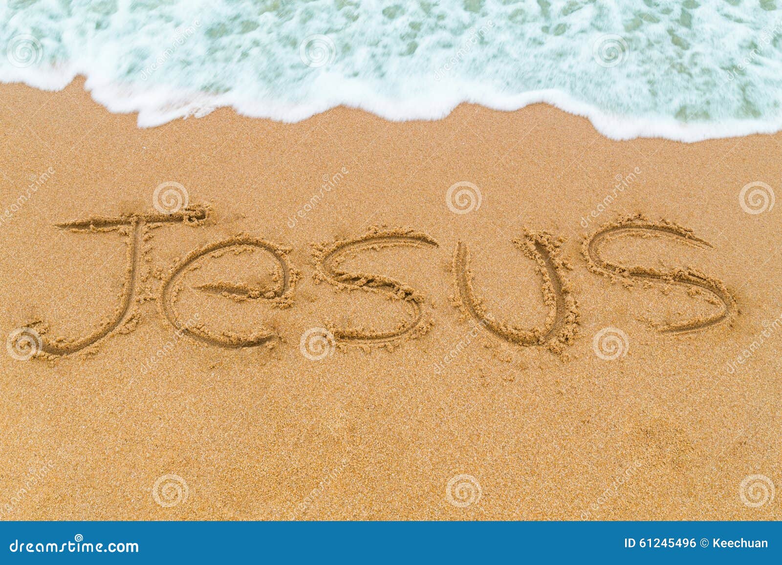 JESUS Inscription Written on Sandy Beach with Wave Approaching Stock ...