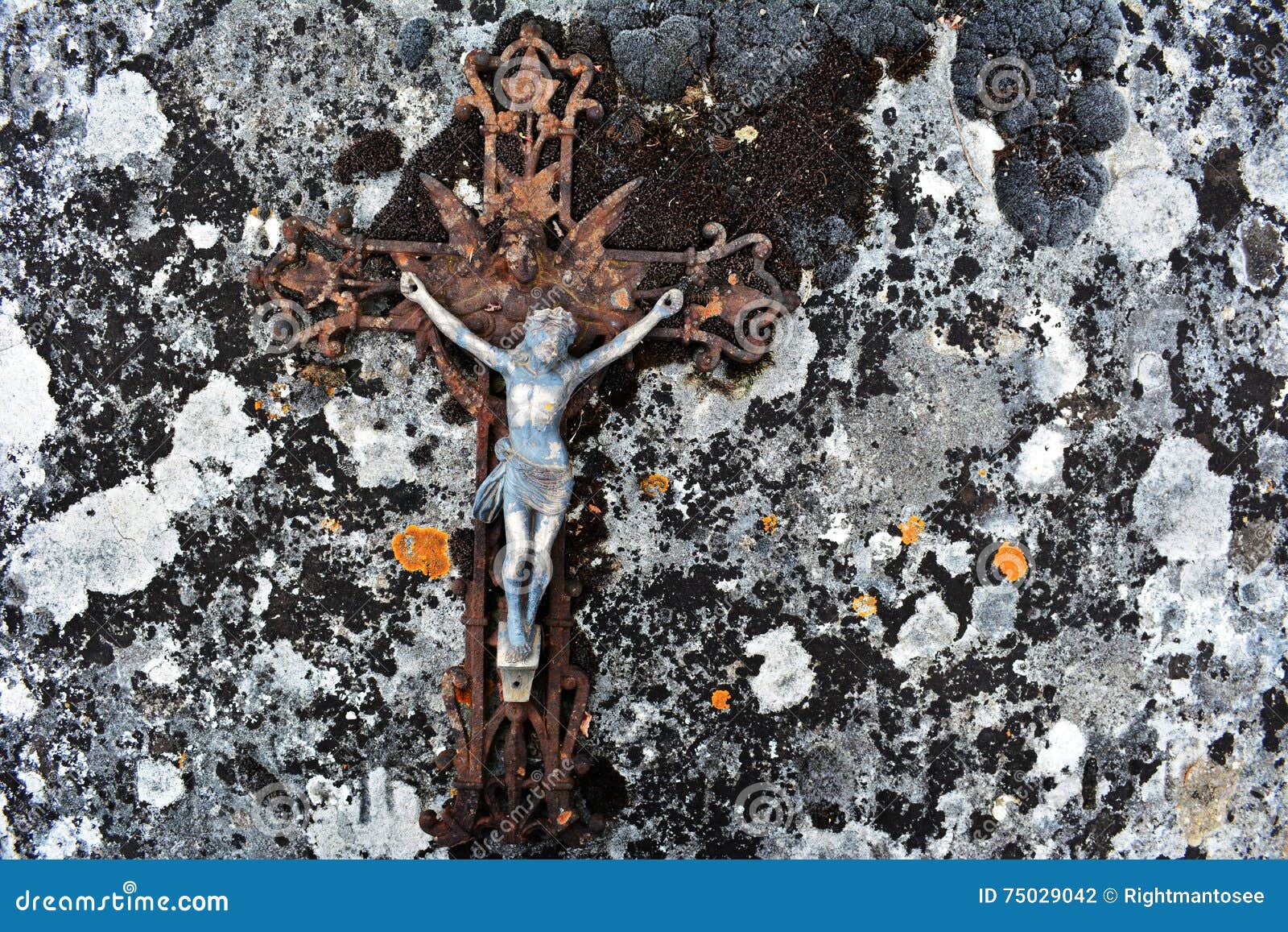 Jesus on Old and Weathered Broken Cross Lying on a Stone with Black ...