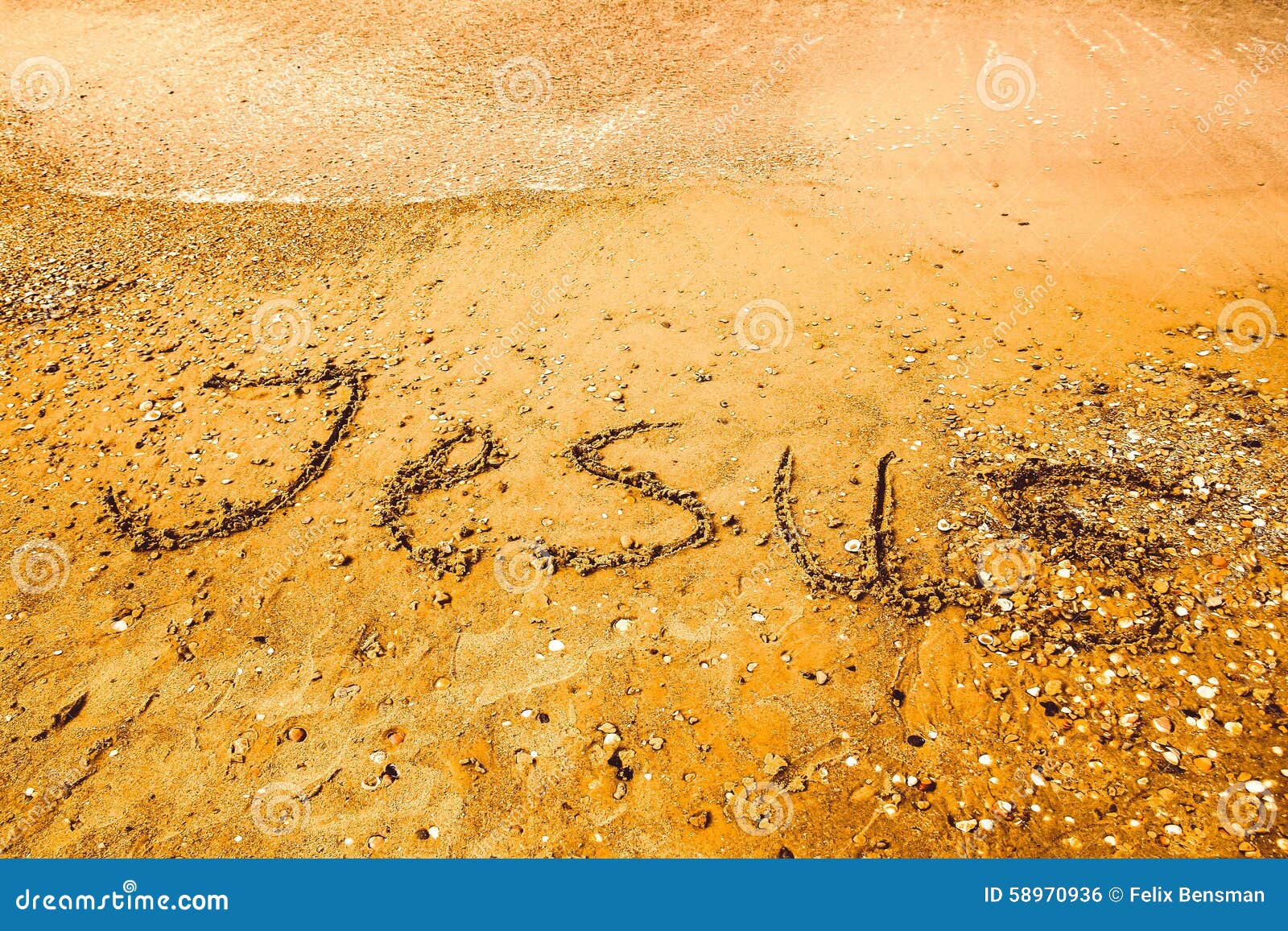 Jesus, Written on a Sandy Beach. Stock Photo - Image of shore ...