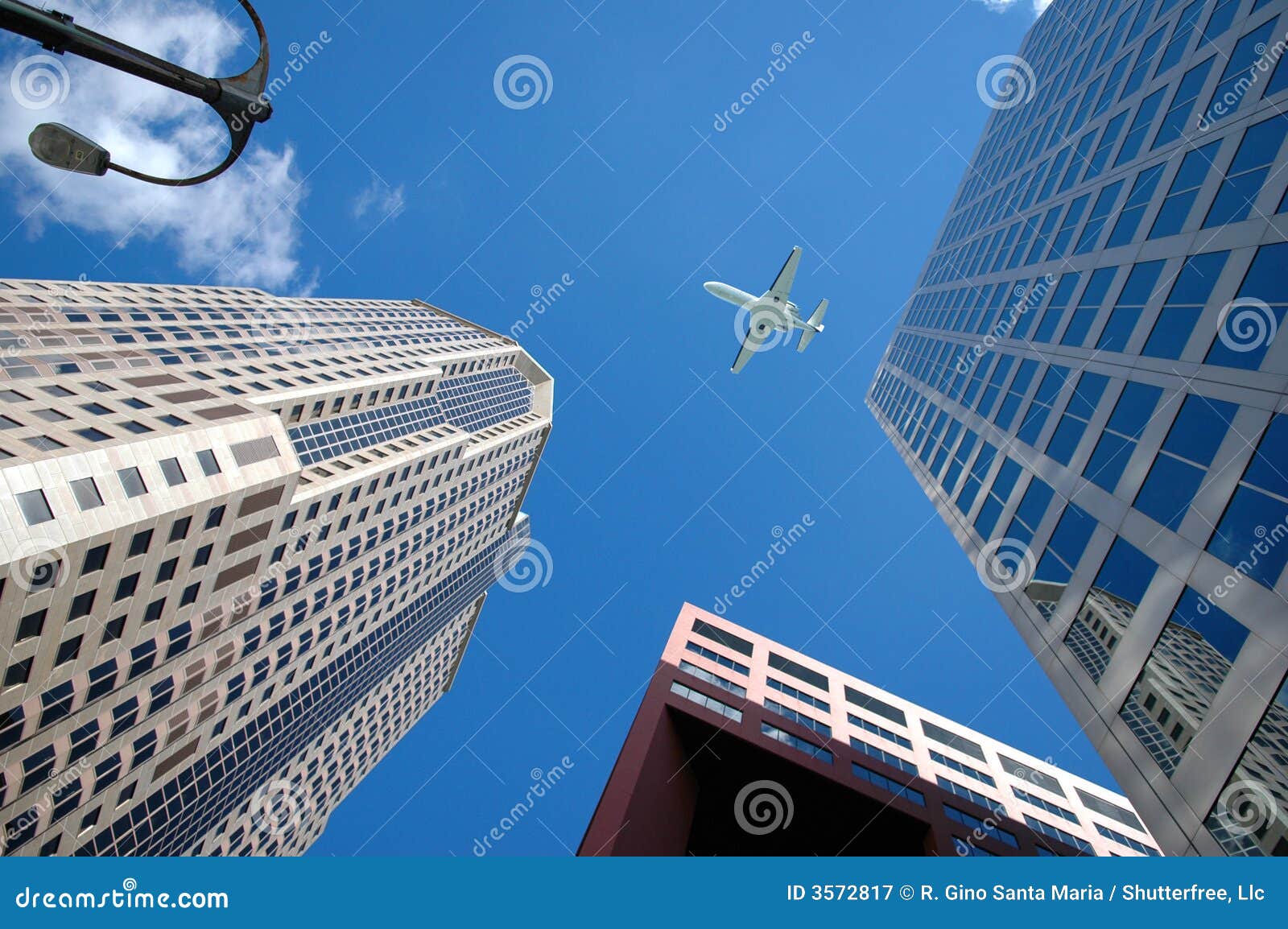 Jet Above Buildings stock image. Image of district, financial - 3572817