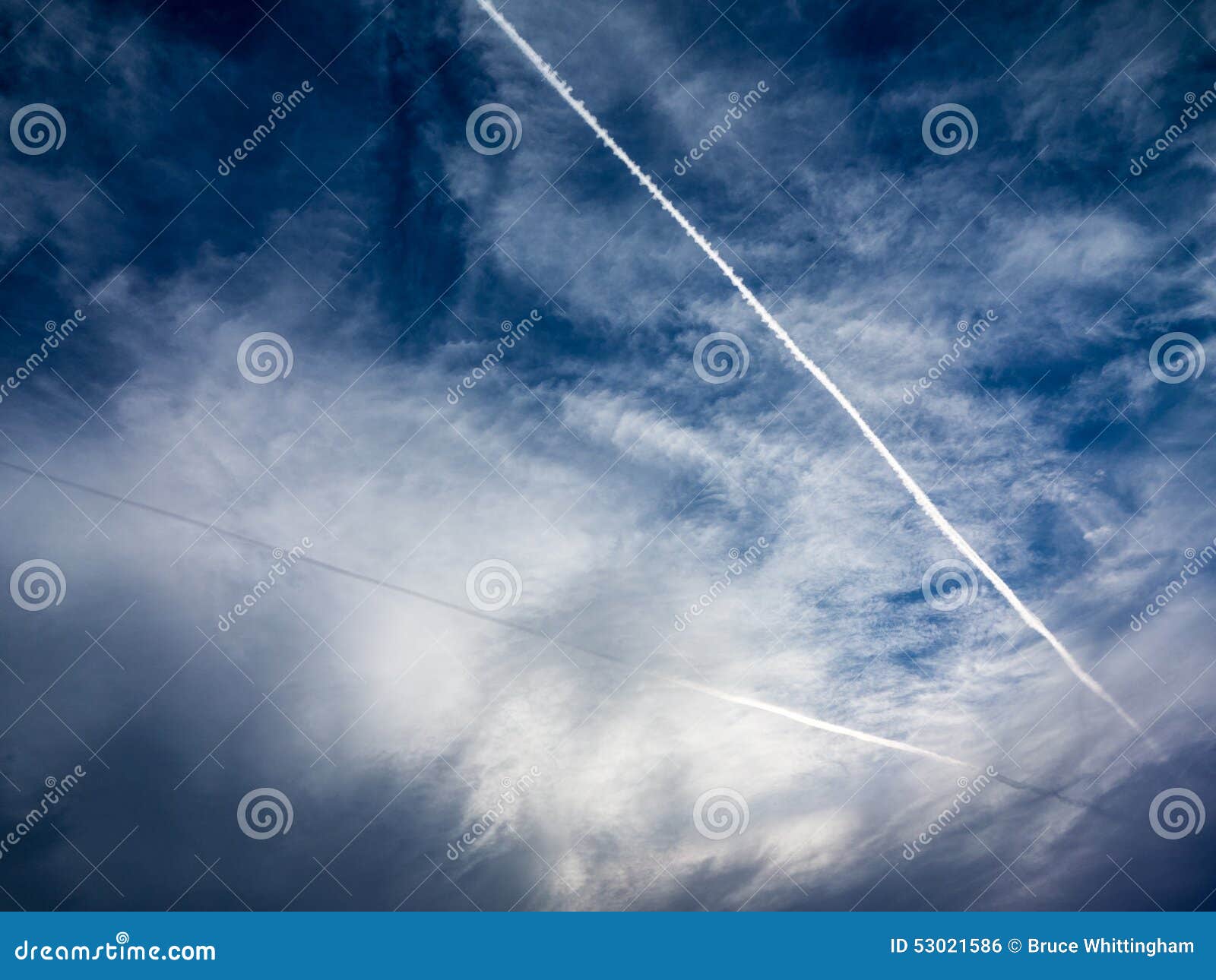 Jet Airplane Contrails stock photo. Image of airplane - 53021586