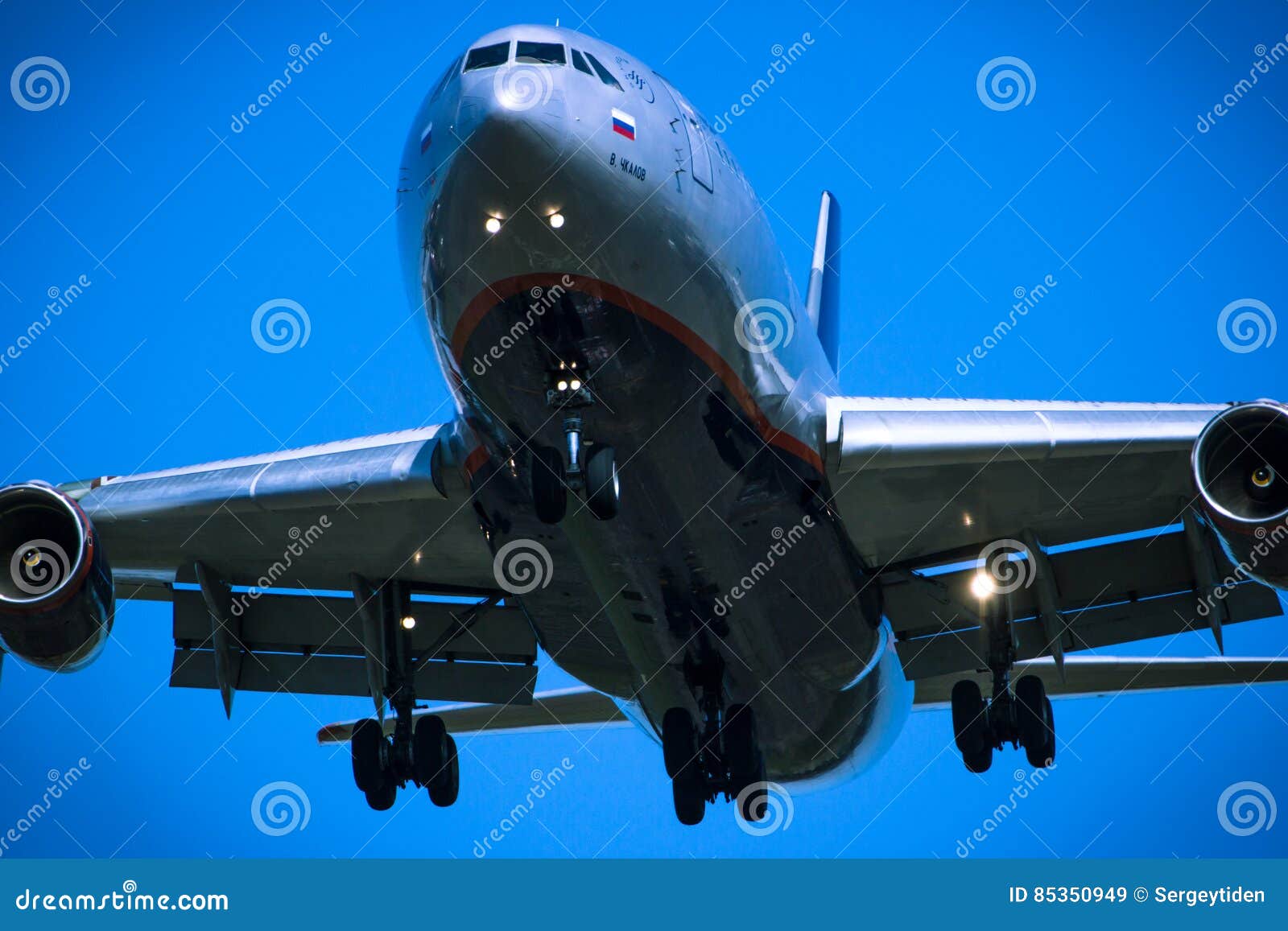 Jet Airplane Flying Overhead Close-up Stock Image - Image of blue ...