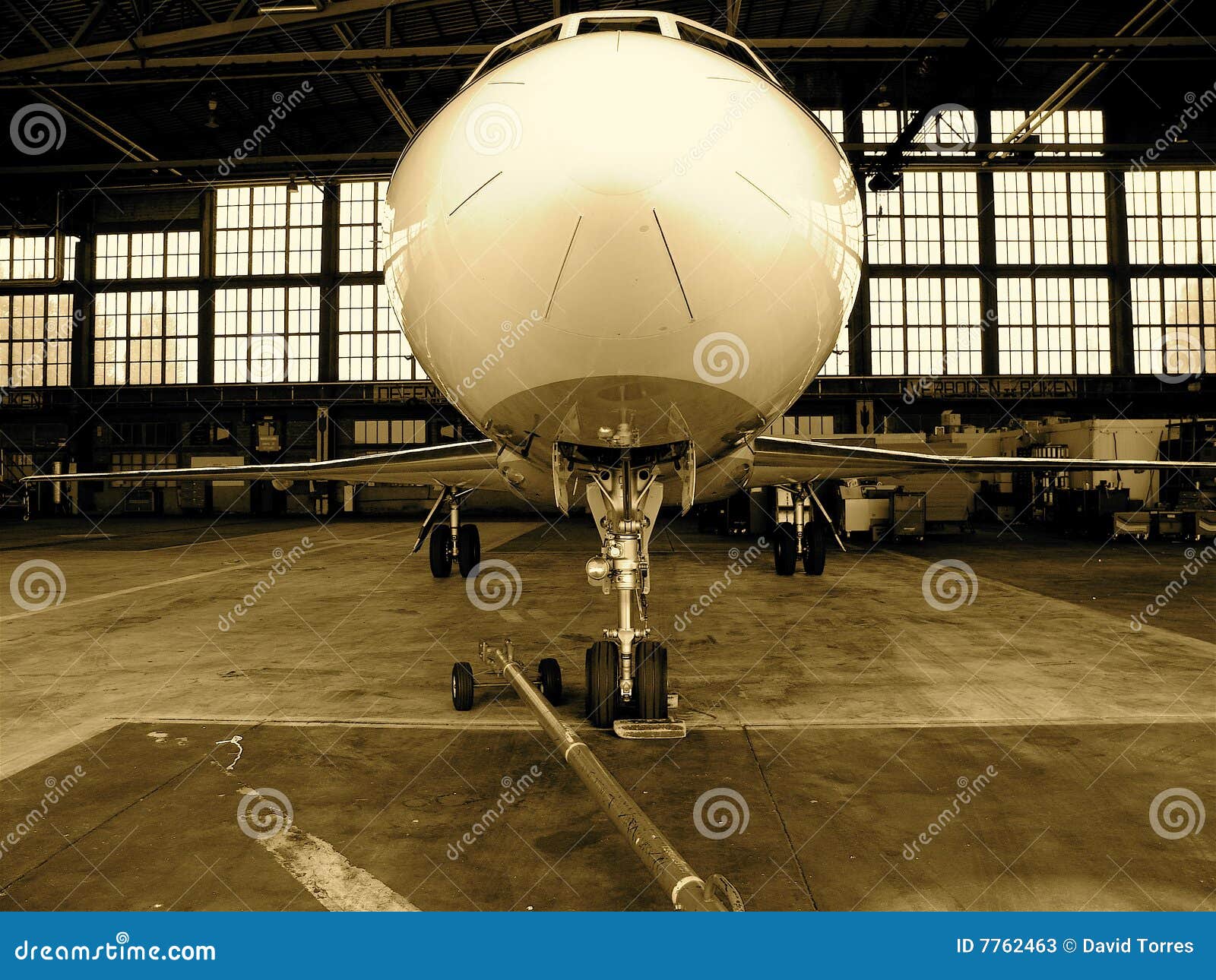 Jet airplane in hanger stock image. Image of impression - 7762463