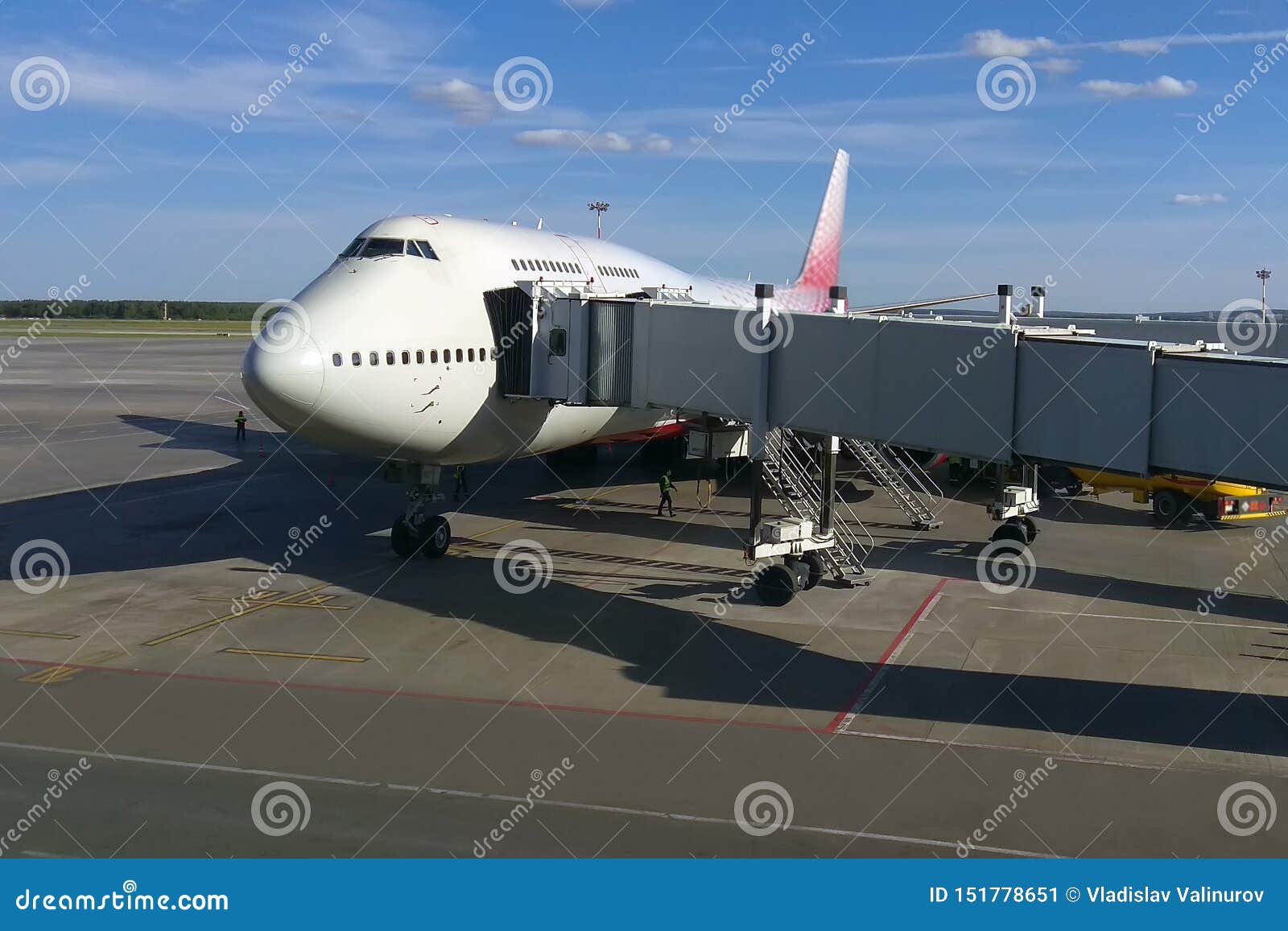 Jet Bridge Attached To a Passenger Plane in the Airfield Editorial ...