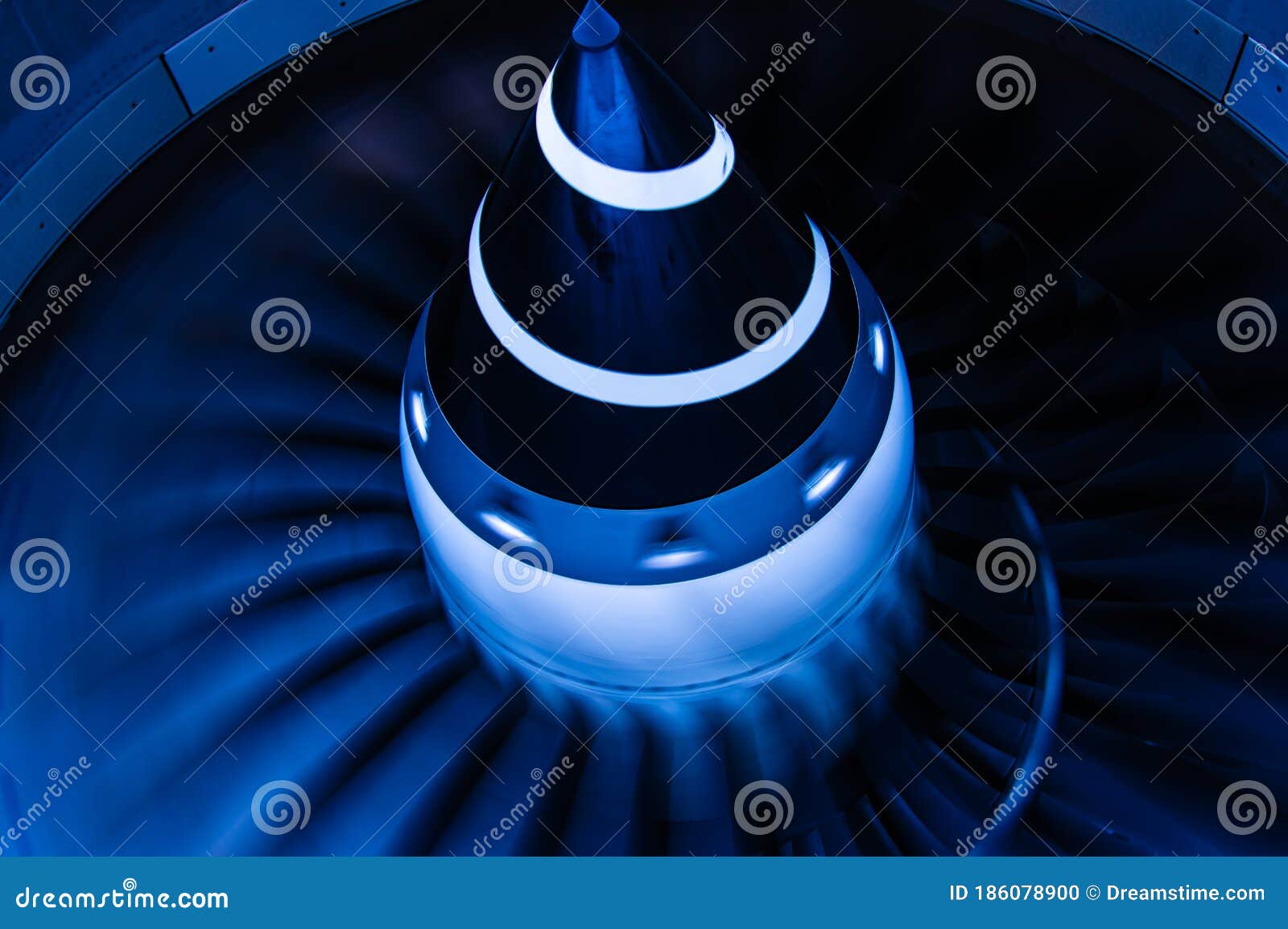 A Jet Engine Turning in the Breeze. Stock Photo - Image of shadows ...