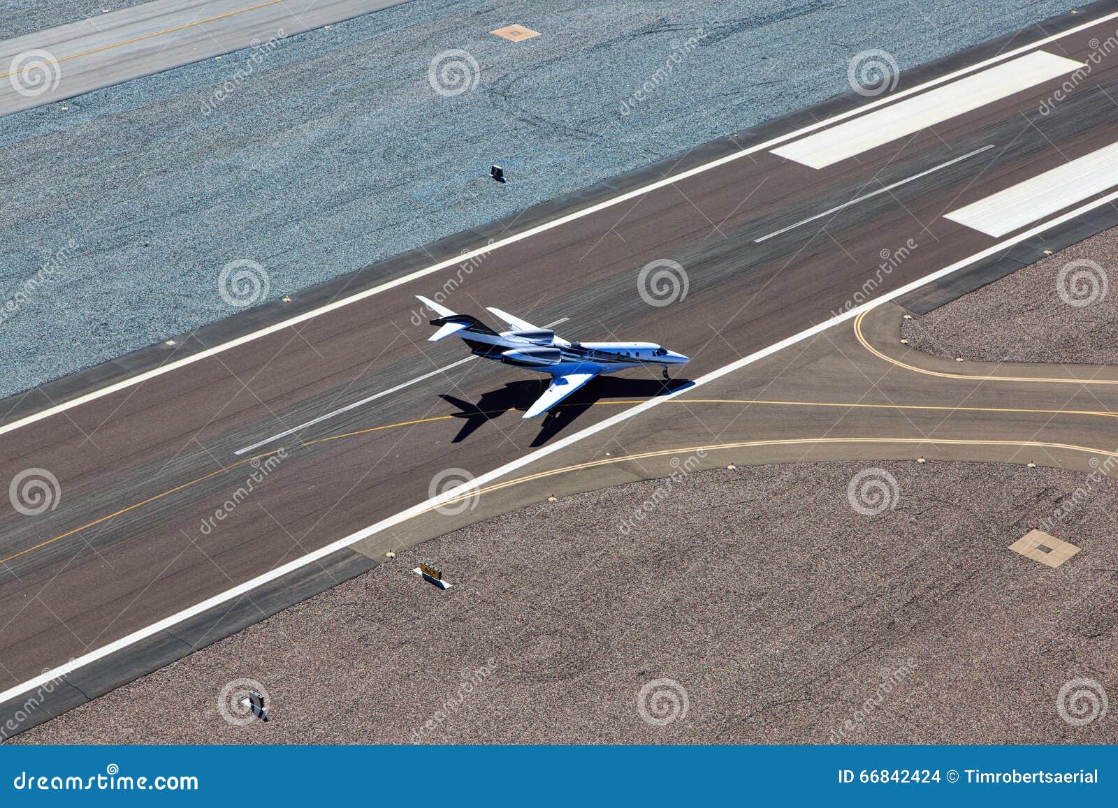 Jet leaving runway stock photo. Image of land, leaving - 66842424