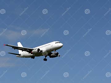 Jet Plane in Flight - Landing Side View 2 Stock Image - Image of ...