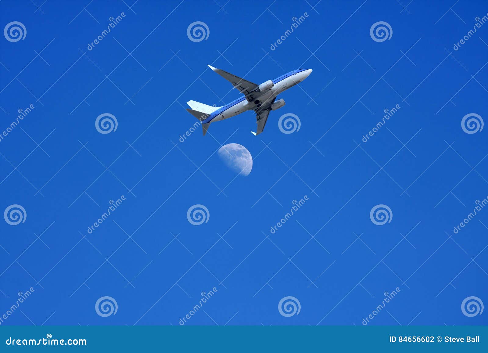 Jet Plane Flying Over the Moon Stock Photo - Image of blue, transport ...