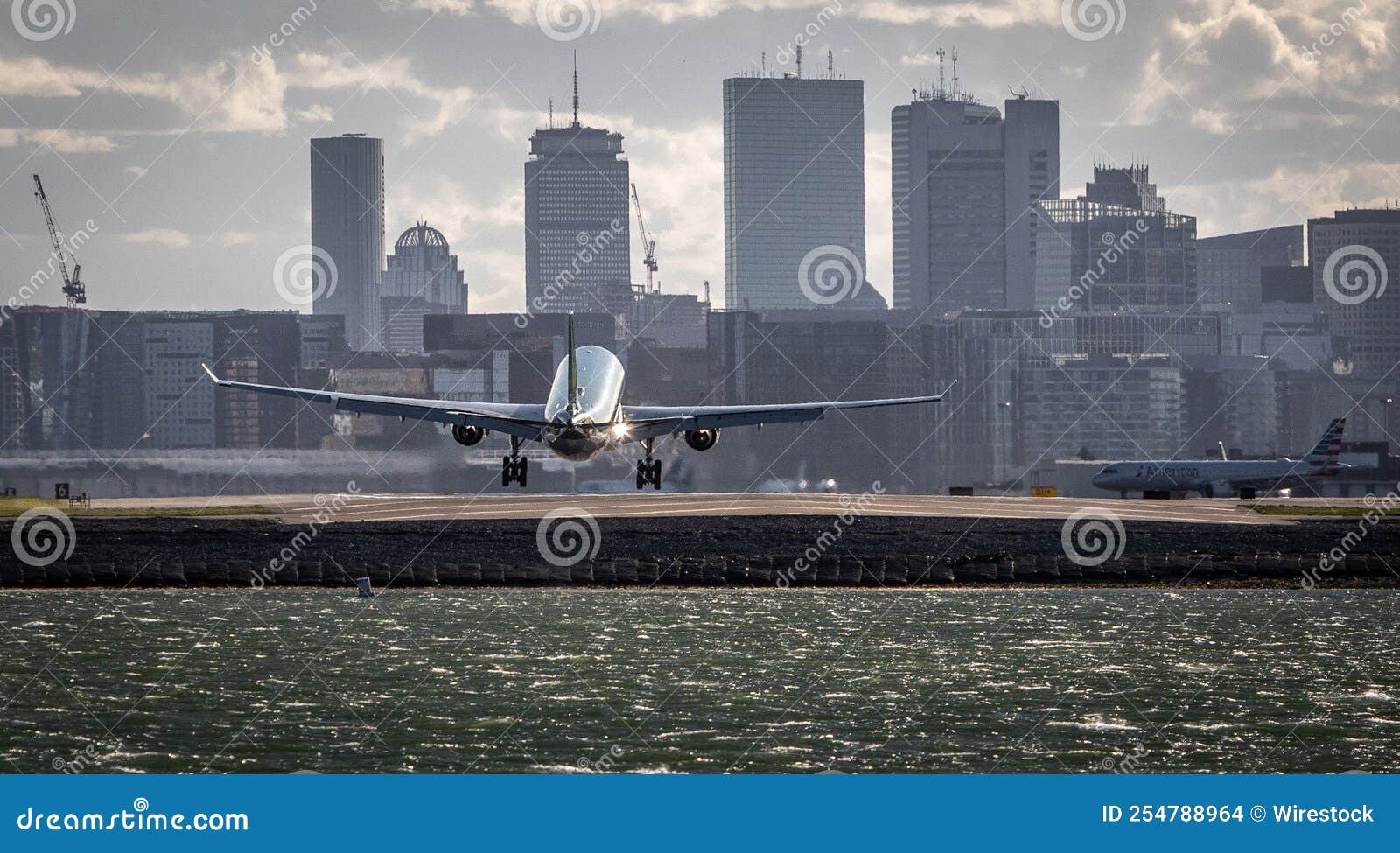Jet Plane Preparing To Touch Down in Boston Editorial Stock Image ...