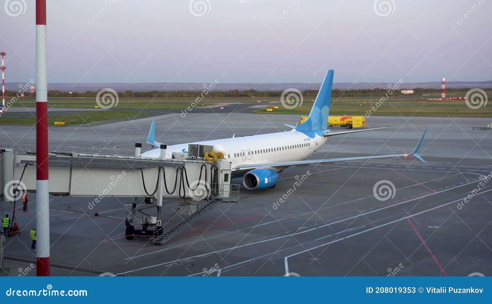 Jet Plane Pulls Up To the Gate. Boeing 737 on the Aircraft Platform ...