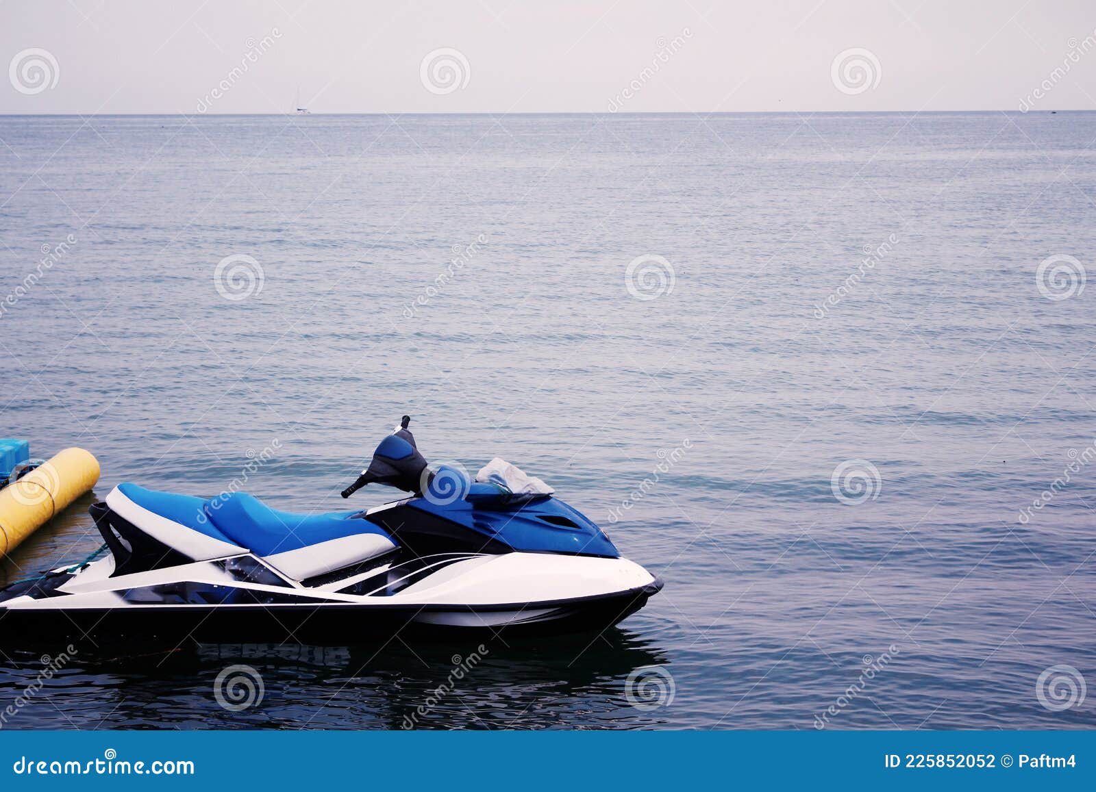 Jet Ski White and Blue on the Pier by the Sea Stock Photo - Image of ...
