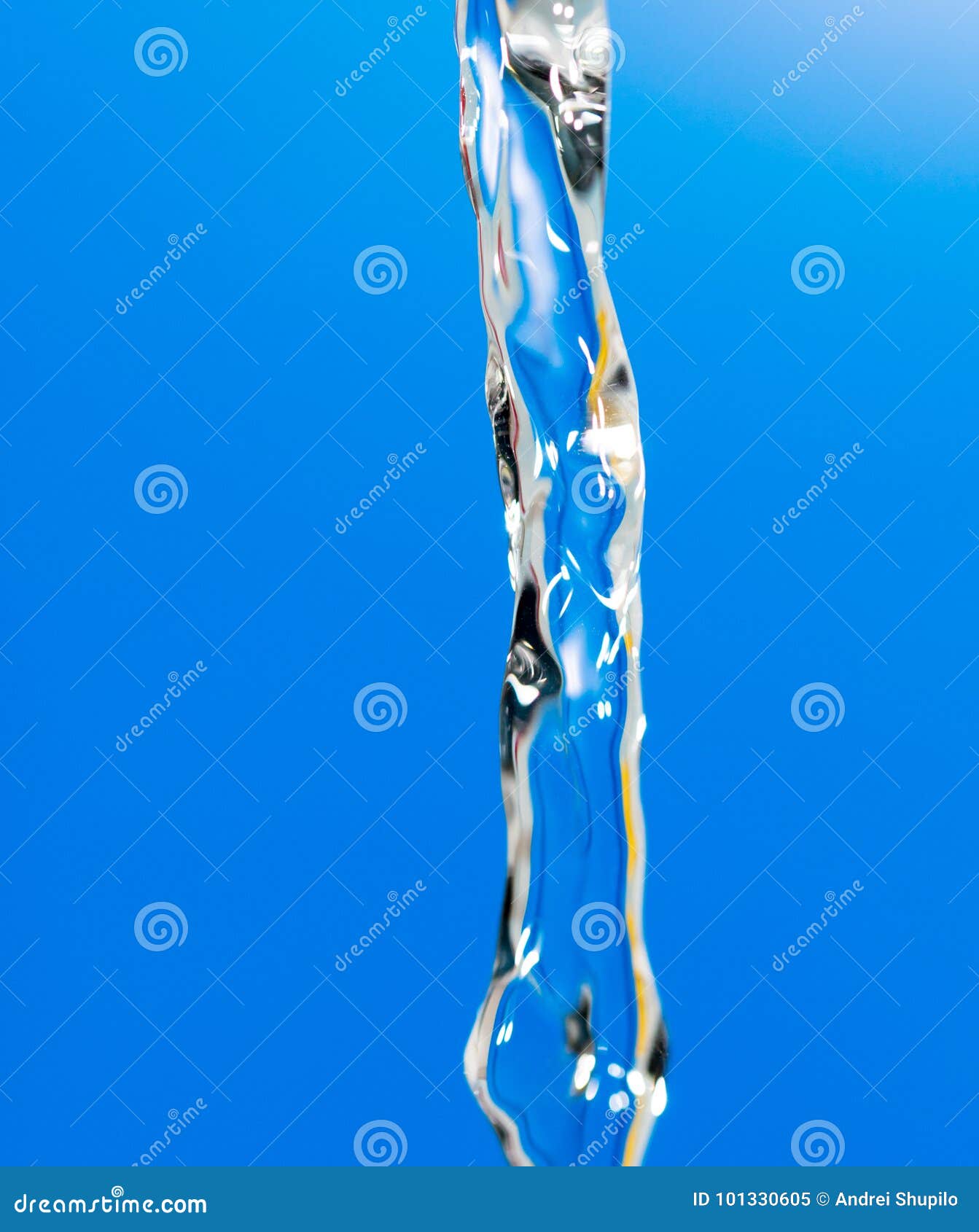 A Jet of Water on a Blue Background Stock Image - Image of pour ...