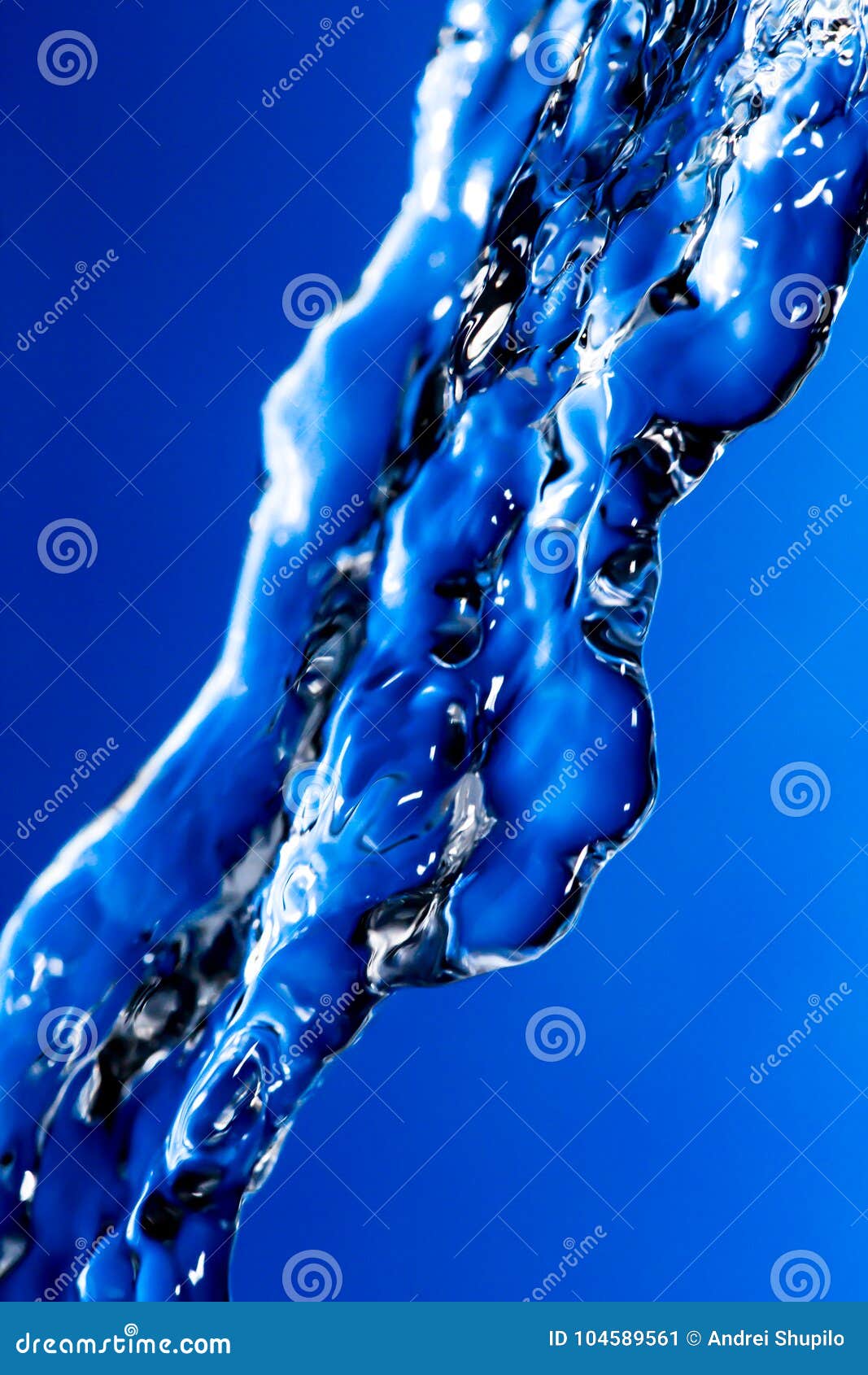 A Jet of Water on a Blue Background Stock Image - Image of blue, bubble ...