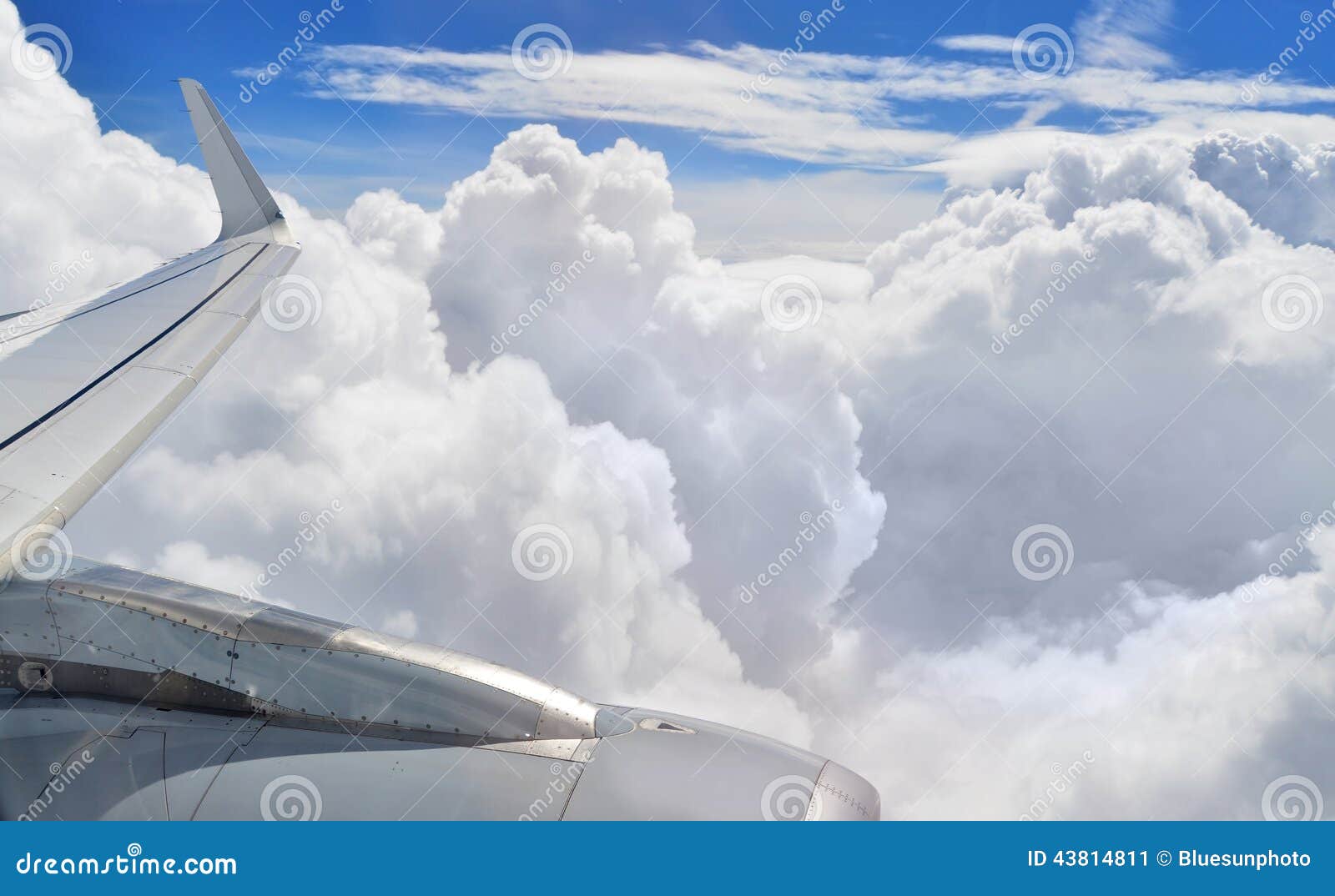 Jet wing and clouds. stock image. Image of wing, blue - 43814811