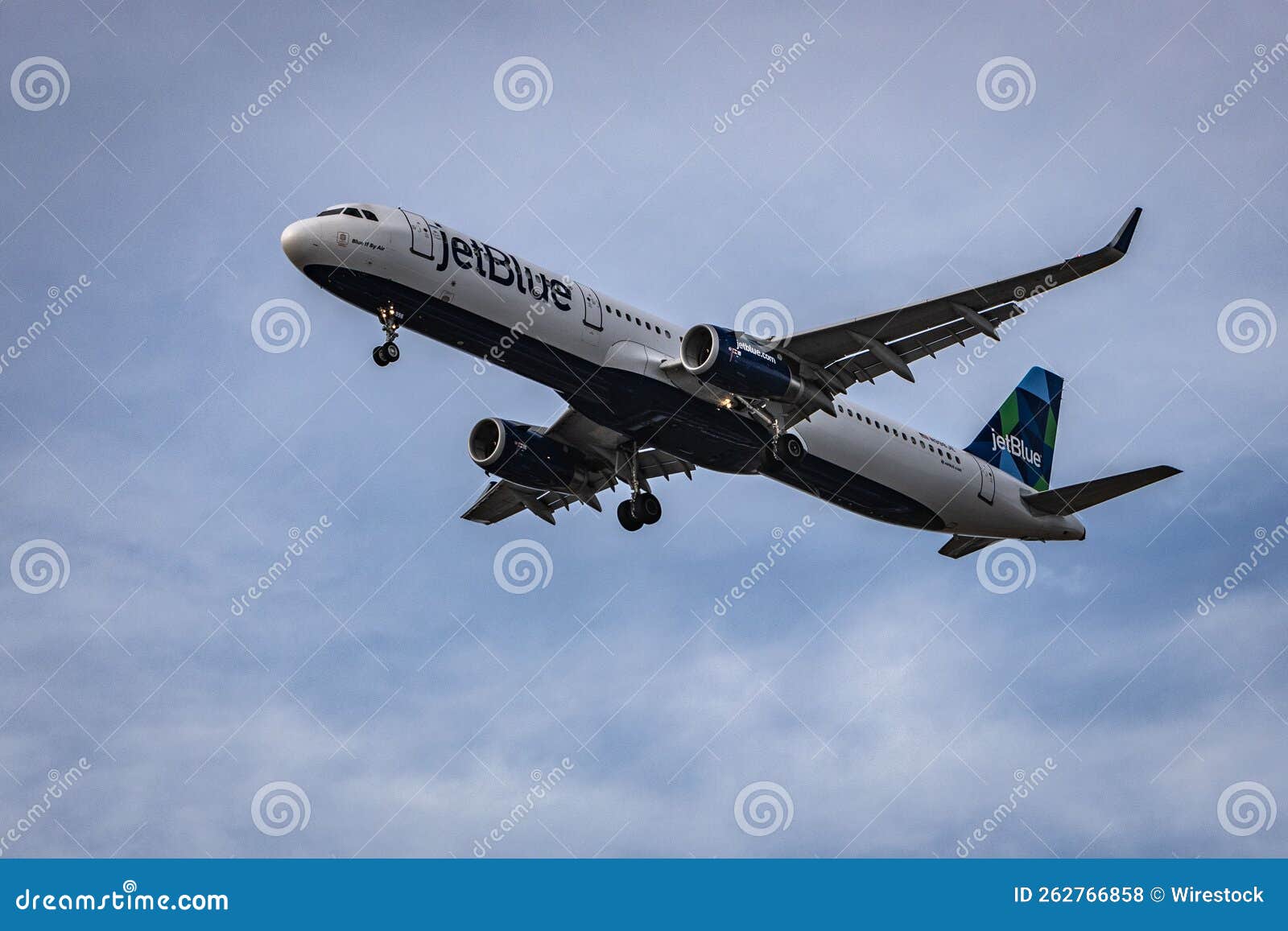 Jetblue Airbus 321 Airplane during the Flight Against the Blue Sky with ...
