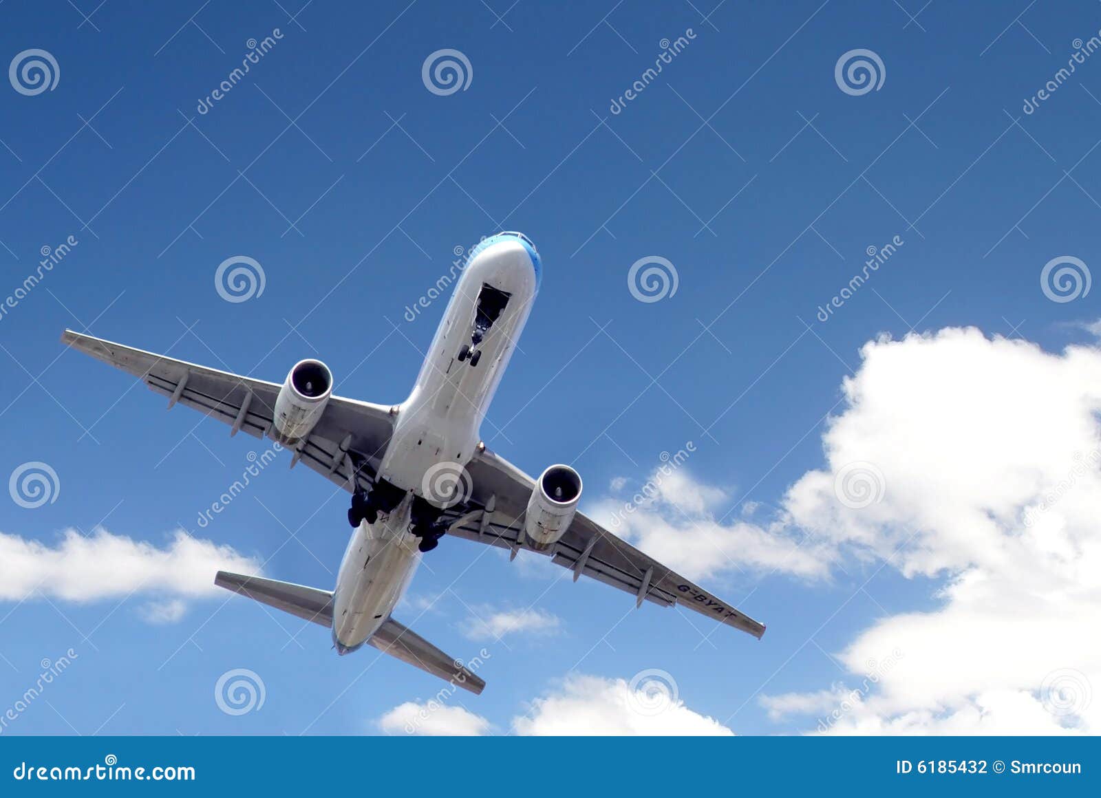 Jetliner in blue sky stock photo. Image of cloudy, bottom - 6185432