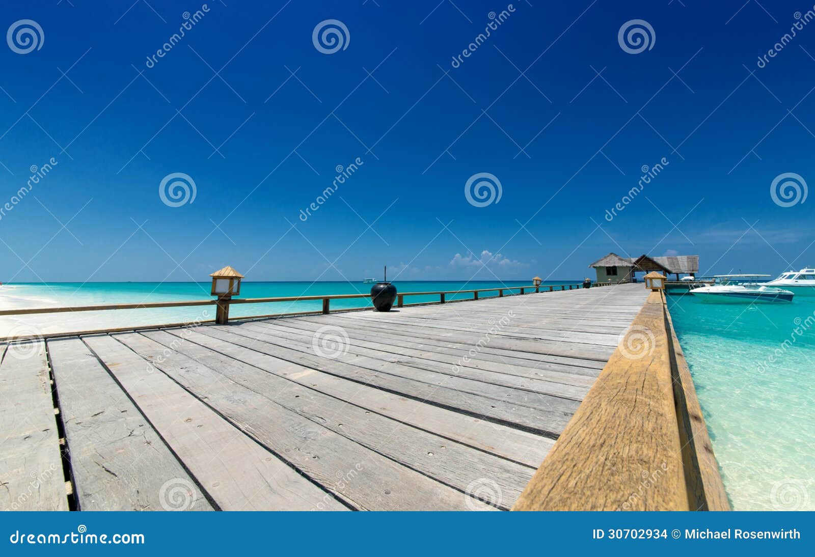 Jetty on the beach stock photo. Image of tropic, pier - 30702934