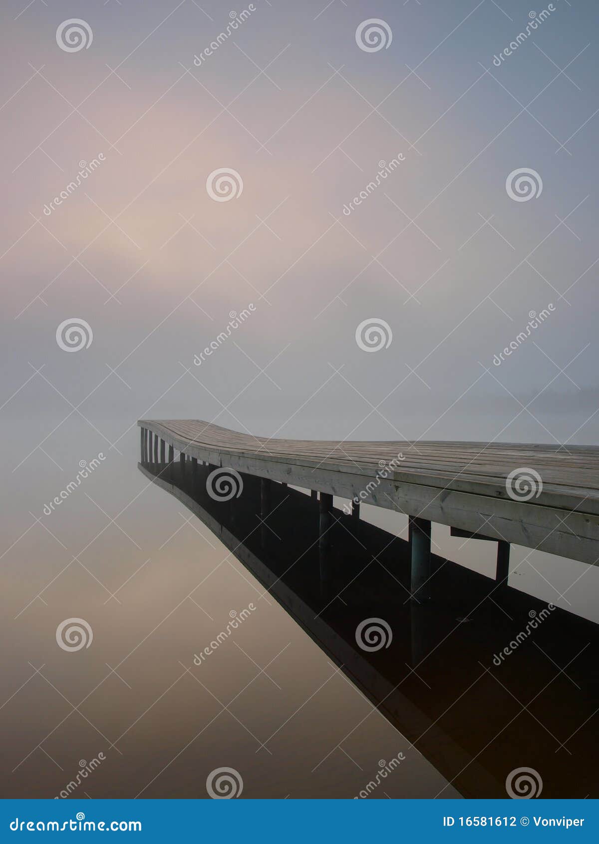 Jetty at a lake stock photo. Image of foggy, boundless - 16581612