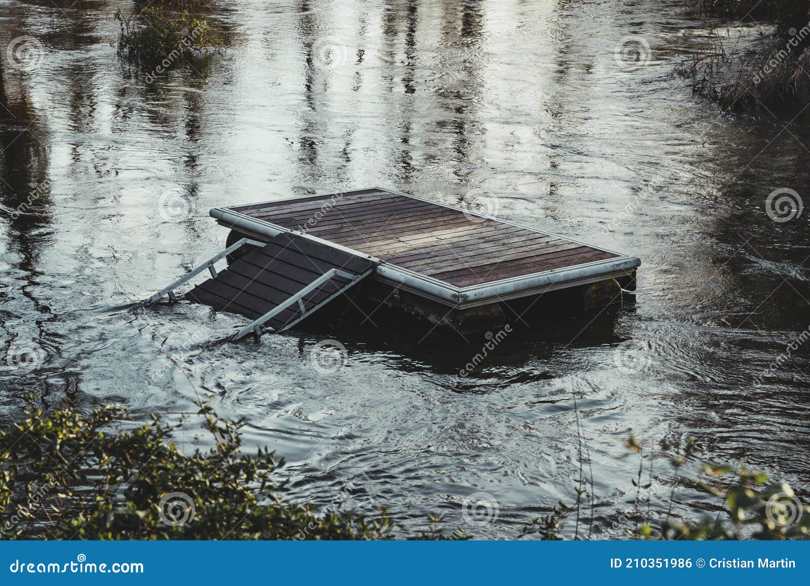 Jetty in the rising river stock photo. Image of dirty - 210351986