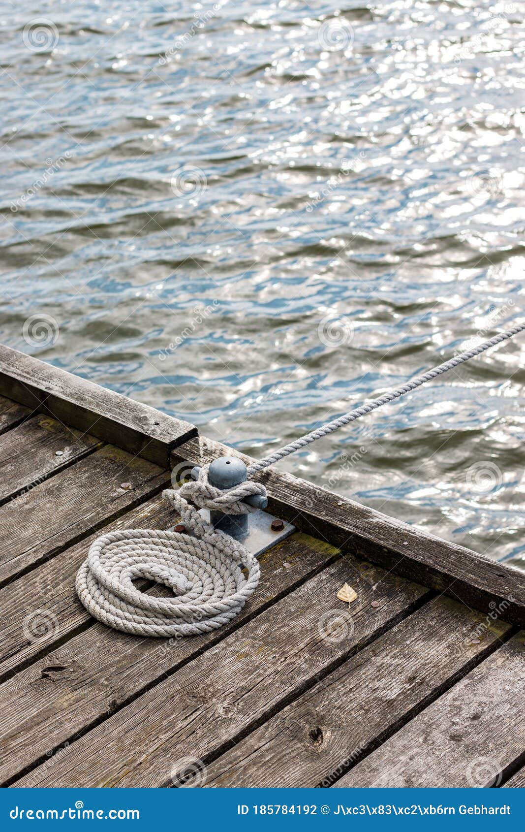 Jetty with Rope for Fastening of the Boat Stock Photo - Image of lake ...