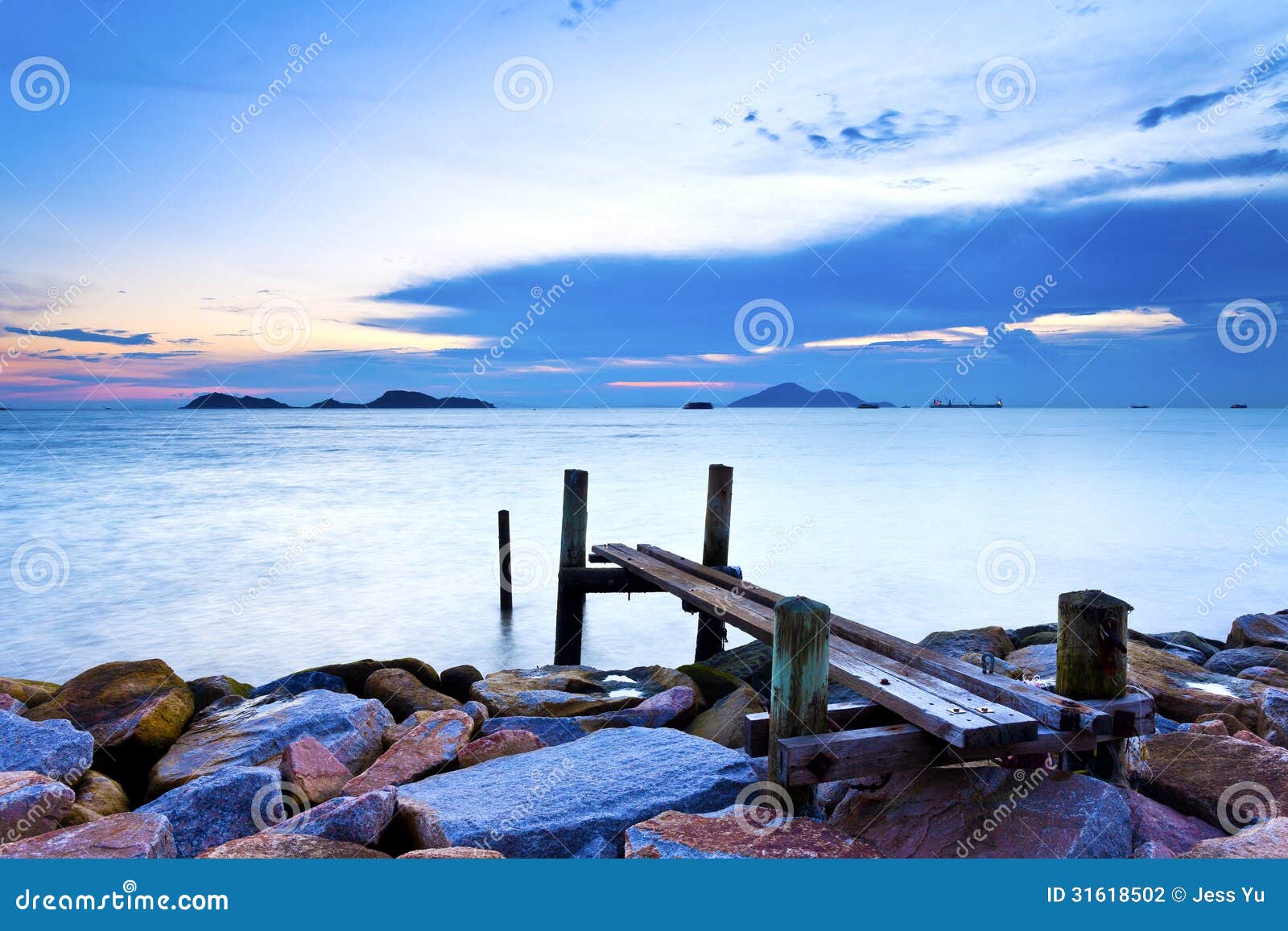 Jetty on sea at sunset stock photo. Image of romantic - 31618502