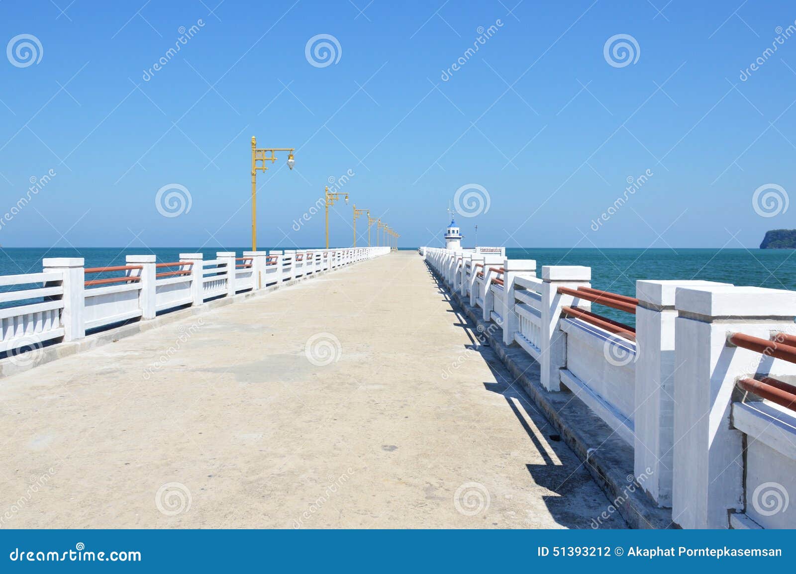 Jetty on the sea stock photo. Image of mountain, sand - 51393212