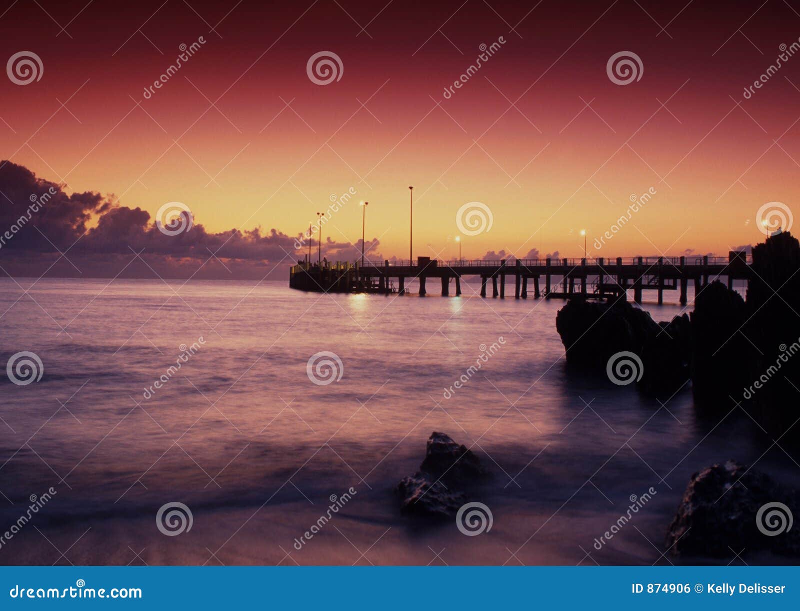 Jetty at sunset stock photo. Image of rocks, night, beach - 874906