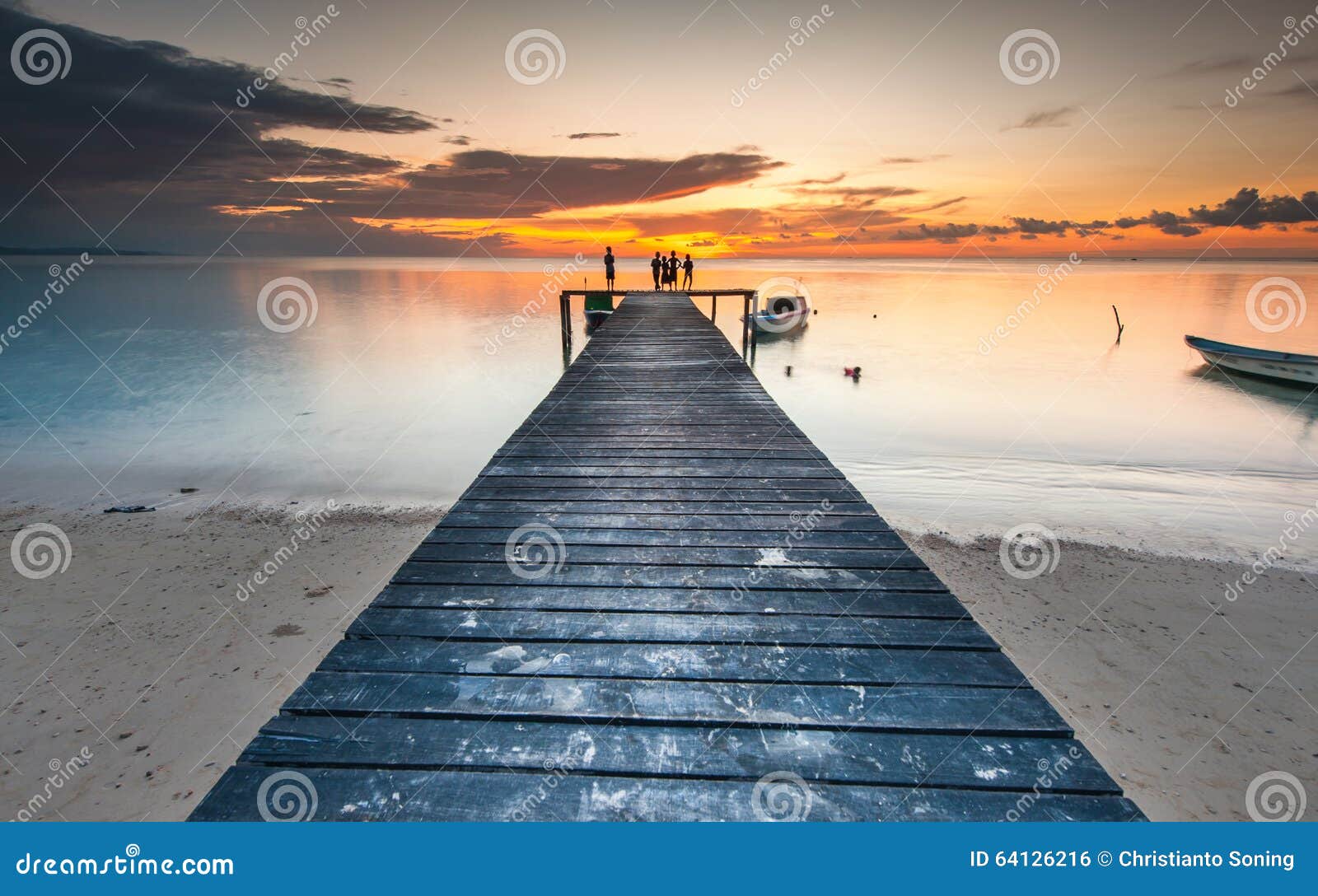 Jetty during sunset stock photo. Image of cloudscape - 64126216