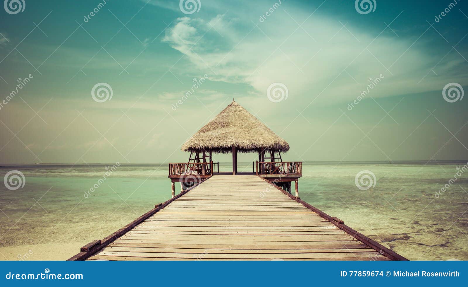 Jetty to a beach hut stock photo. Image of landscape - 77859674