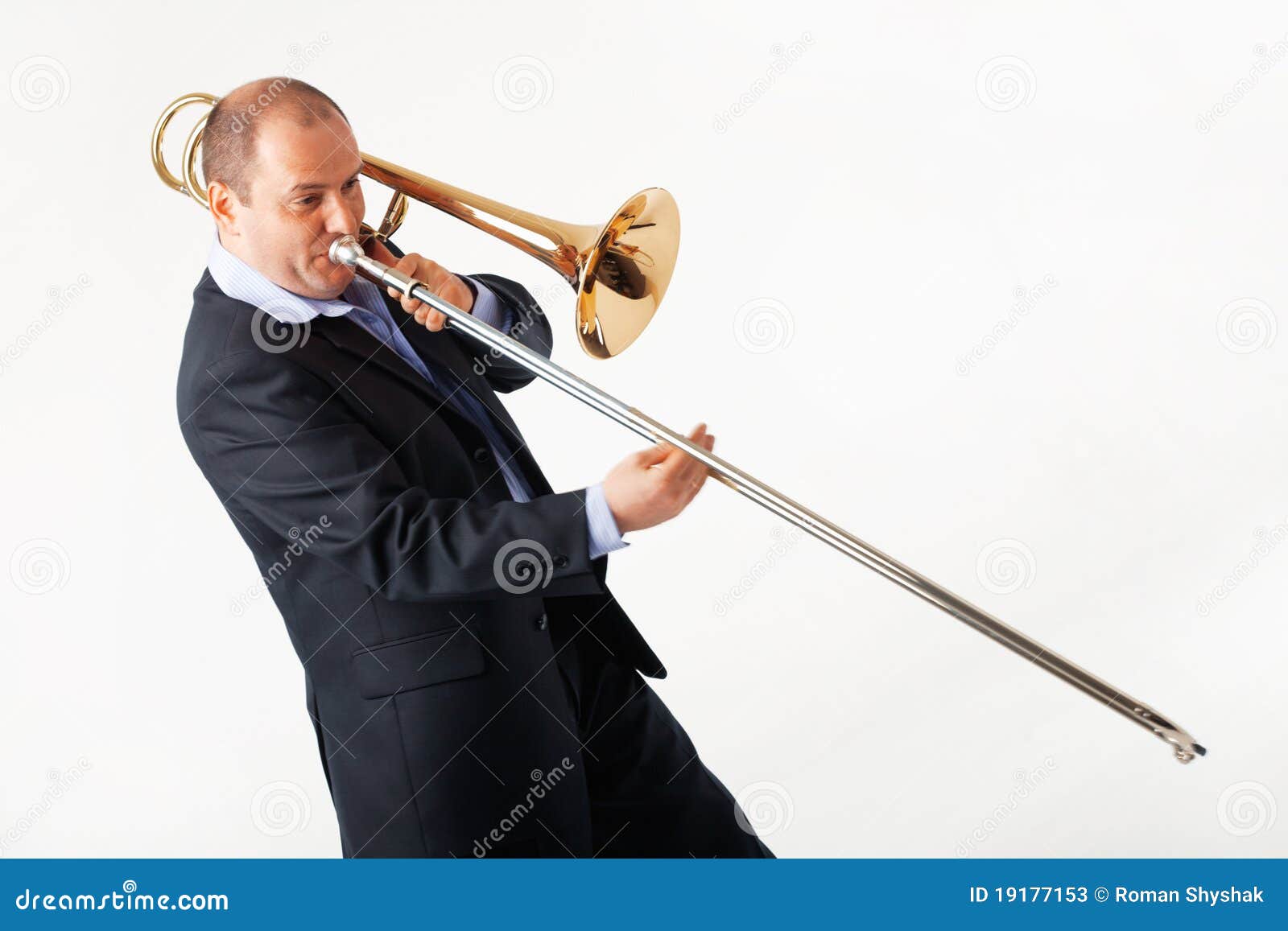 Jeune joueur de Trombone image stock. Image du jazz, musique - 19177153