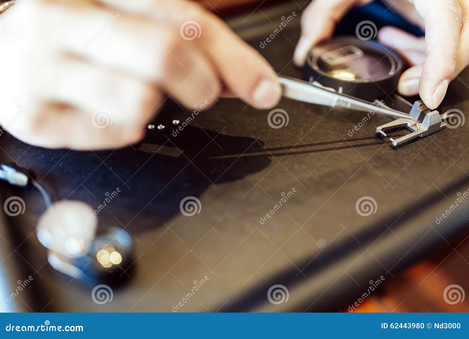 Jeweler Checking Size of Diamond Stock Photo - Image of looking ...