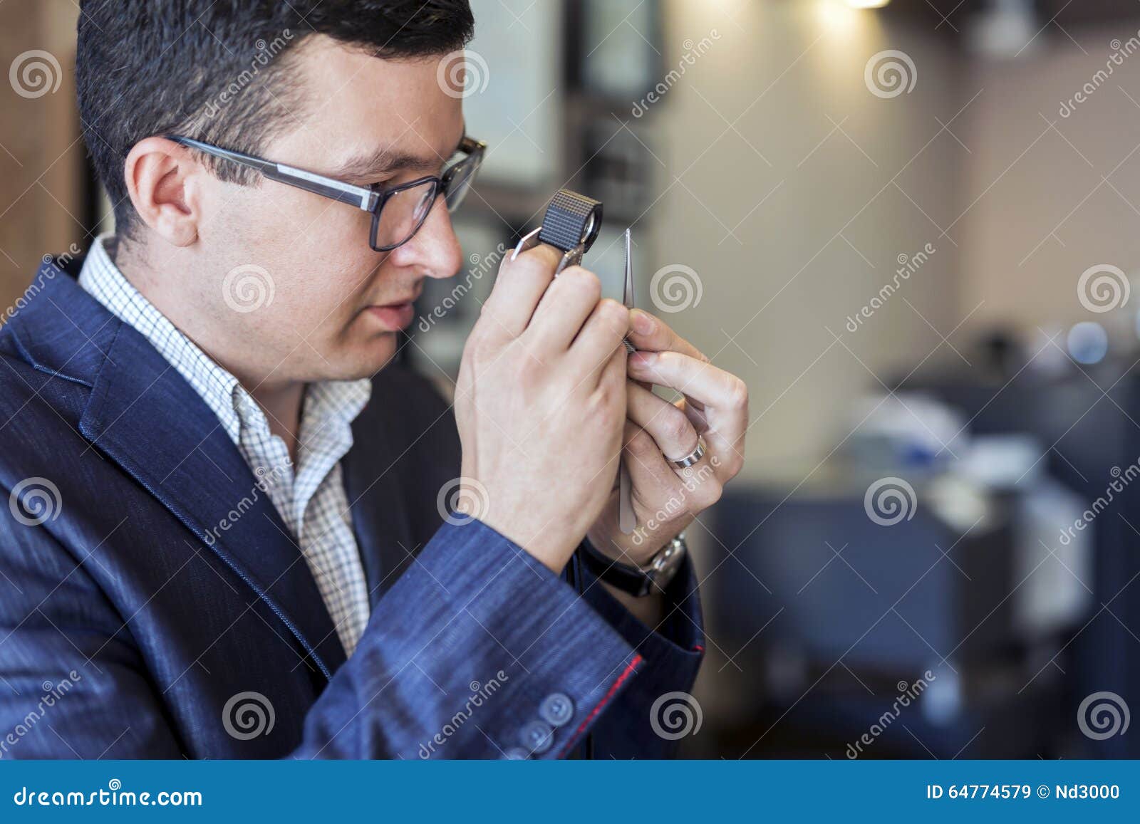 Jeweler Examining Diamond through Loupe Stock Image - Image of closeup ...
