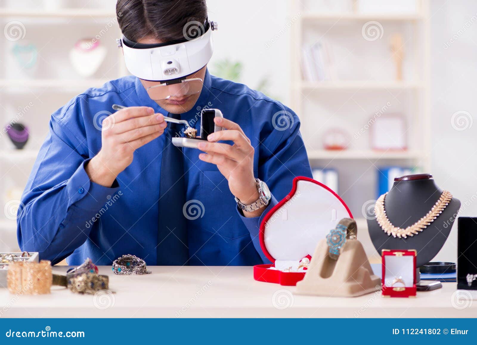 The Jeweler Working with Luxury Jewelry in the Workshop Stock Photo ...