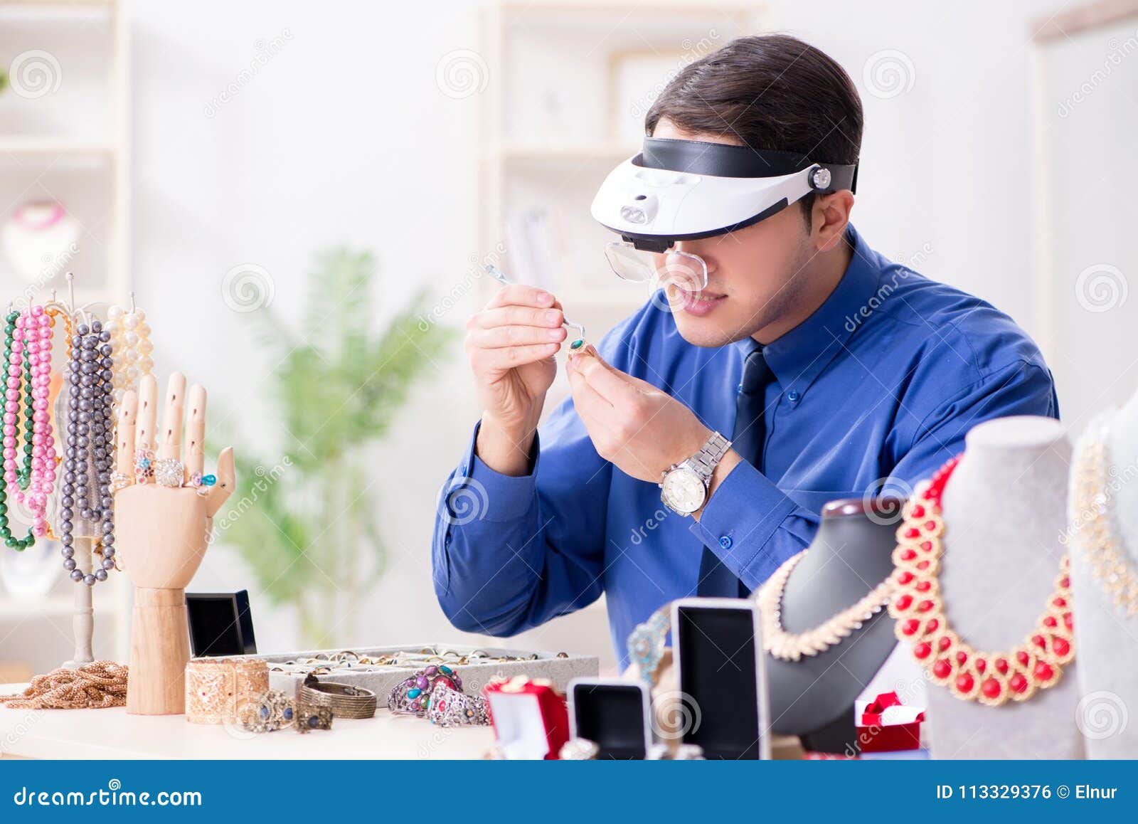 The Jeweler Working with Luxury Jewelry in the Workshop Stock Photo ...