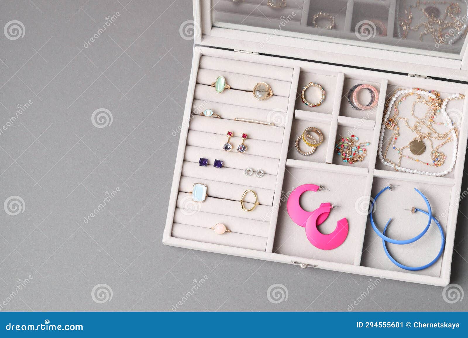 Jewelry Box with Many Different Accessories on Gray Background, Top ...