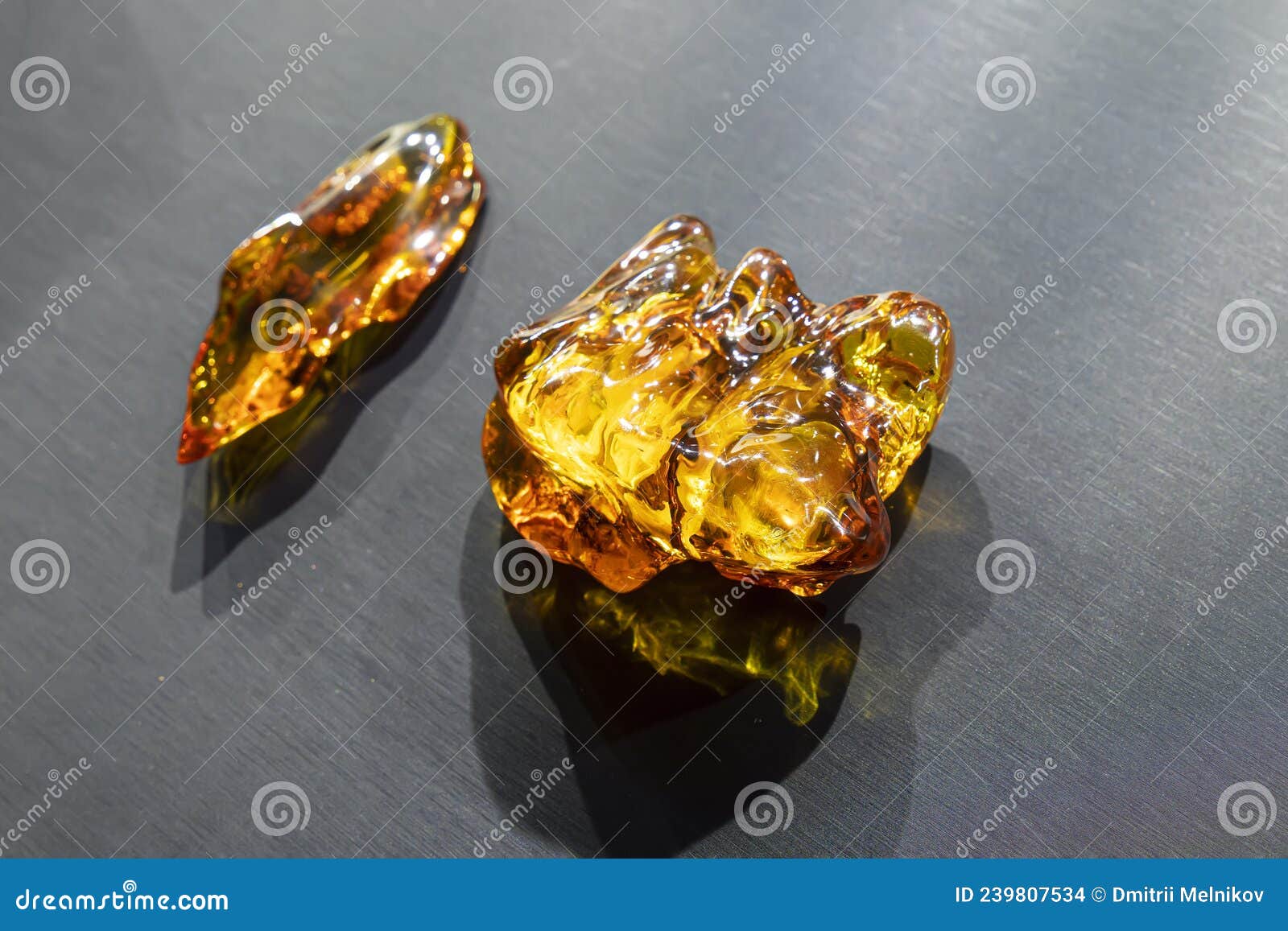 Jewelry Made of Amber. Natural Amber on the Table Stock Photo - Image ...