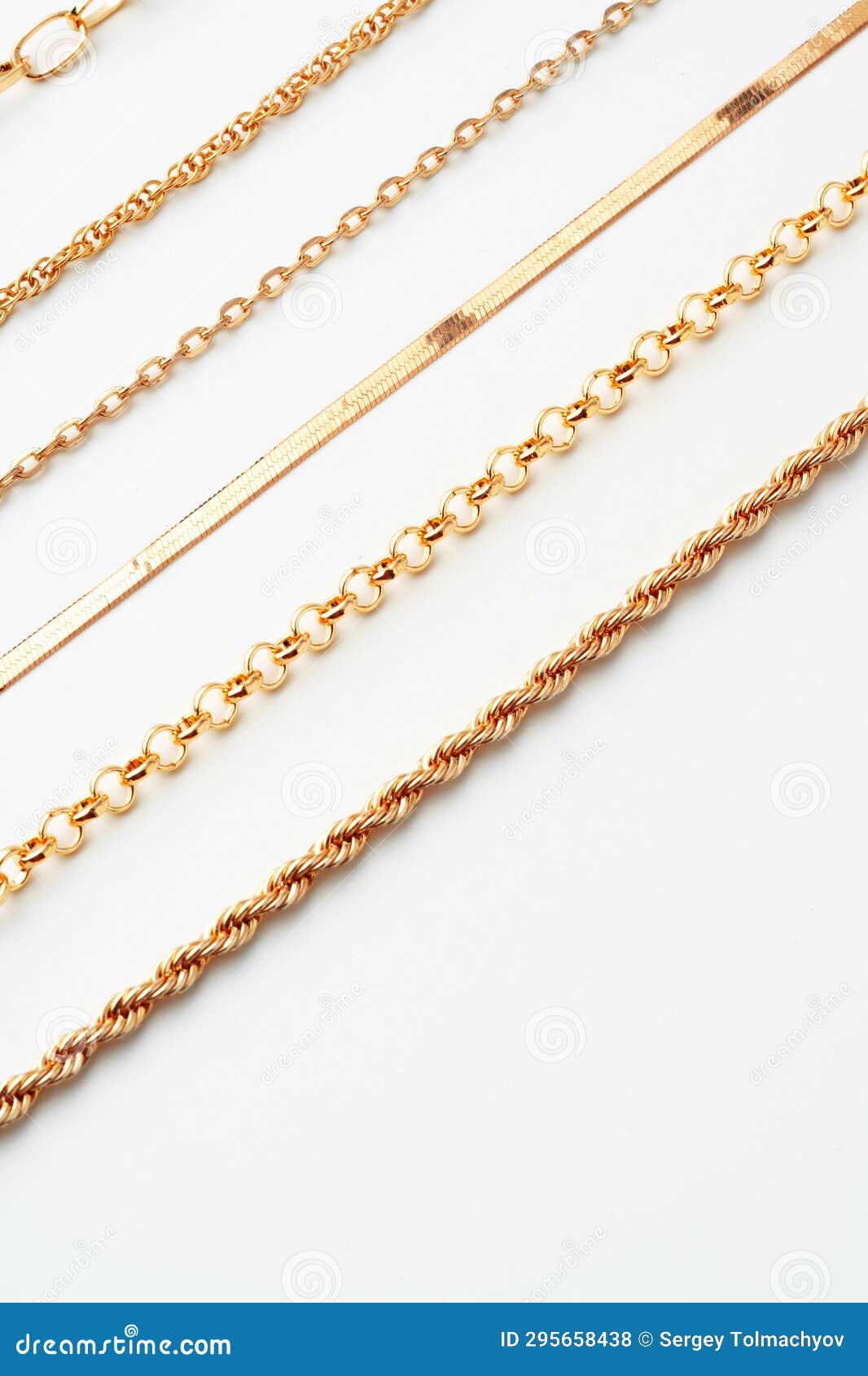 Jewelry Set of Golden Chains on the White Background Stock Photo ...