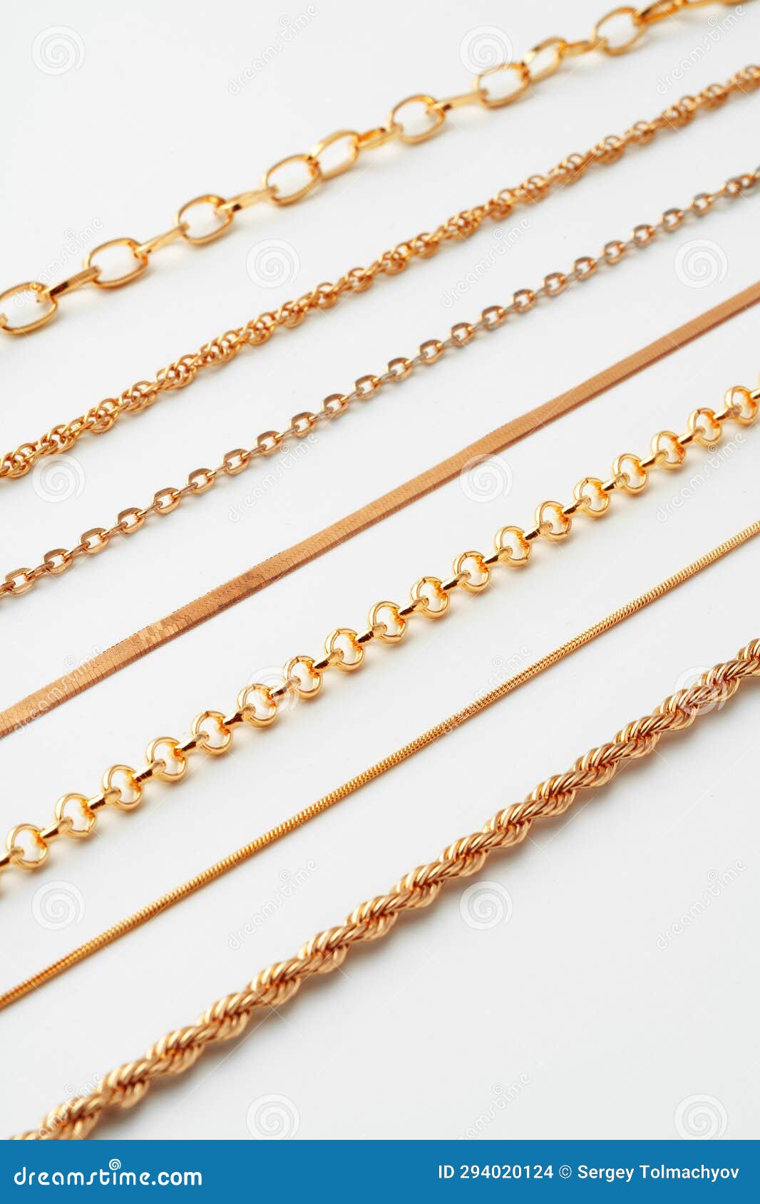 Jewelry Set of Golden Chains on the White Background Stock Photo ...