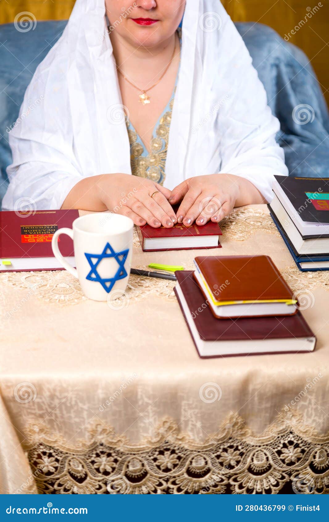 Jewish Female Rabbi Of The Reform Community In A White Veil Reads A