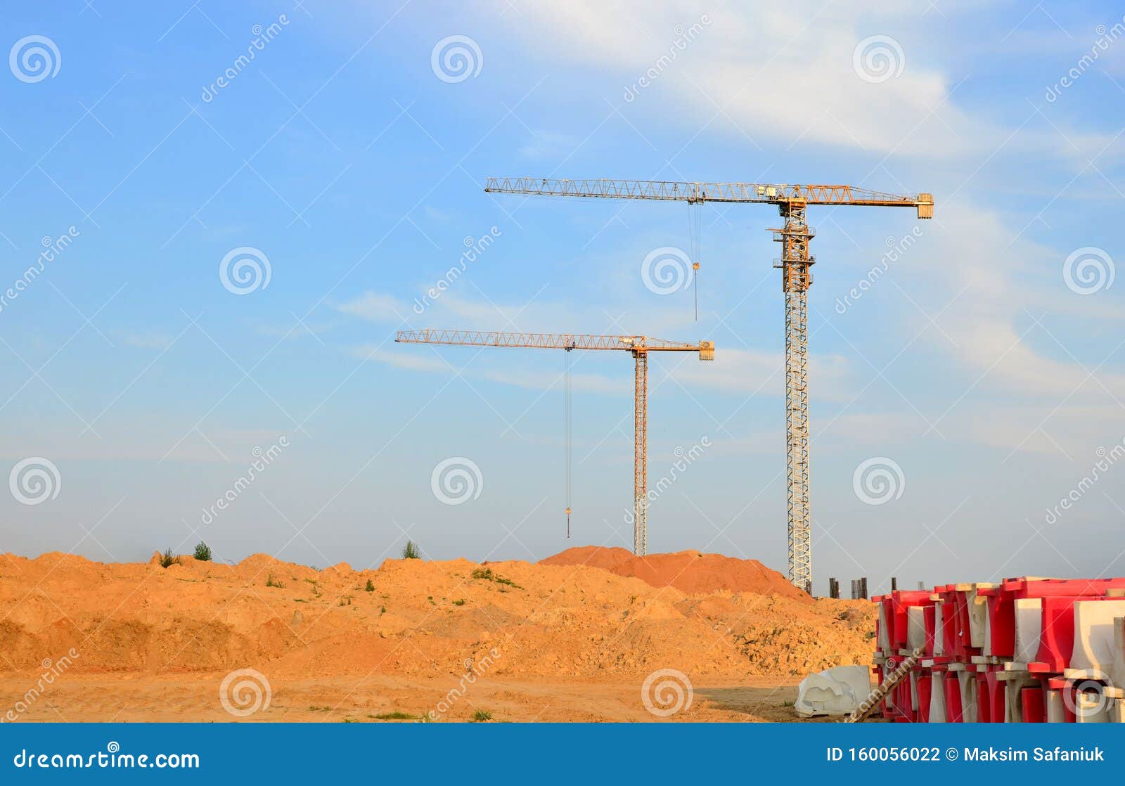 Jib Construction Tower Cranes at a Construction Site on the Blue Sky ...