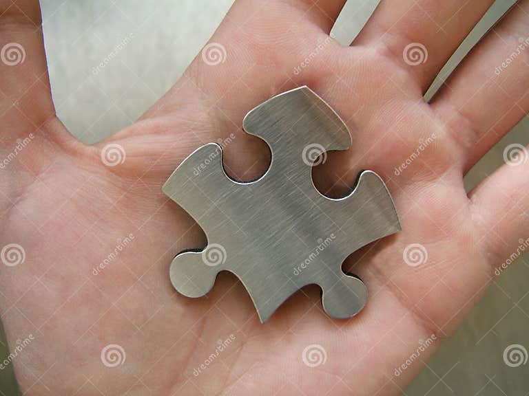 Jigsaw in a hand stock image. Image of concepts, design - 513387